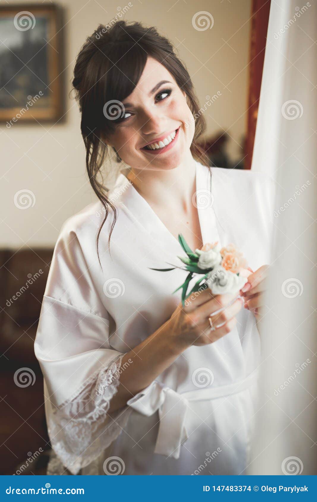 Gorgeous Bride in Robe Posing and Preparing for the Wedding Ceremony ...