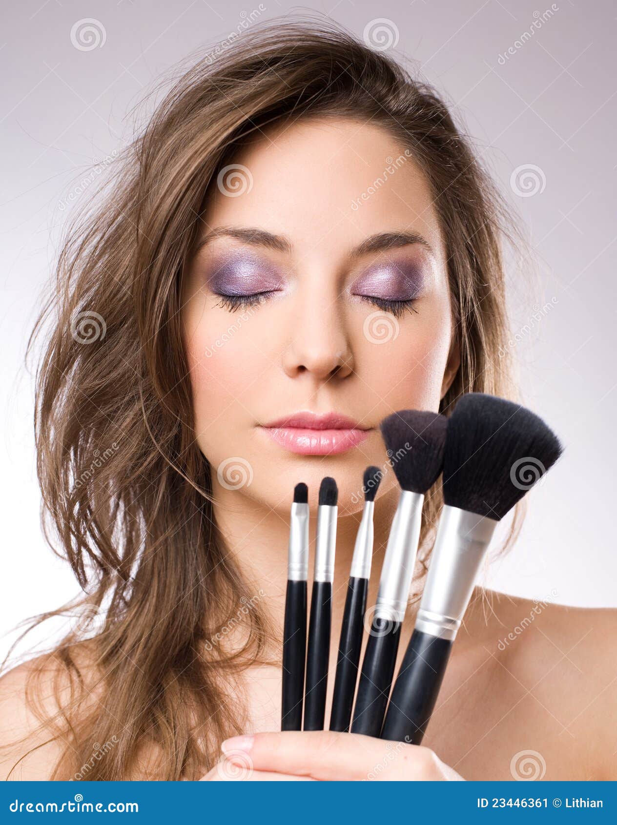 Gorgeous Brunette Woman with Makeup Tools. Stock Image - Image of ...