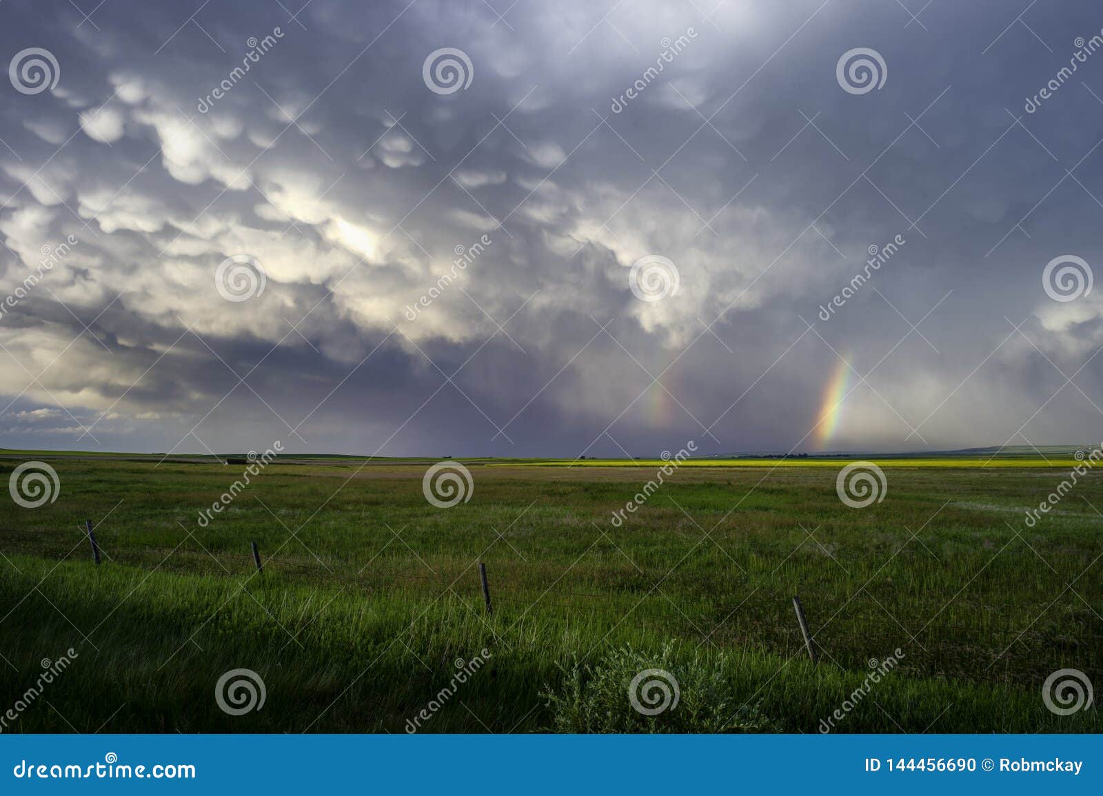 Storm Clouds Over the Prairies Stock Photo - Image of alberta, fences ...