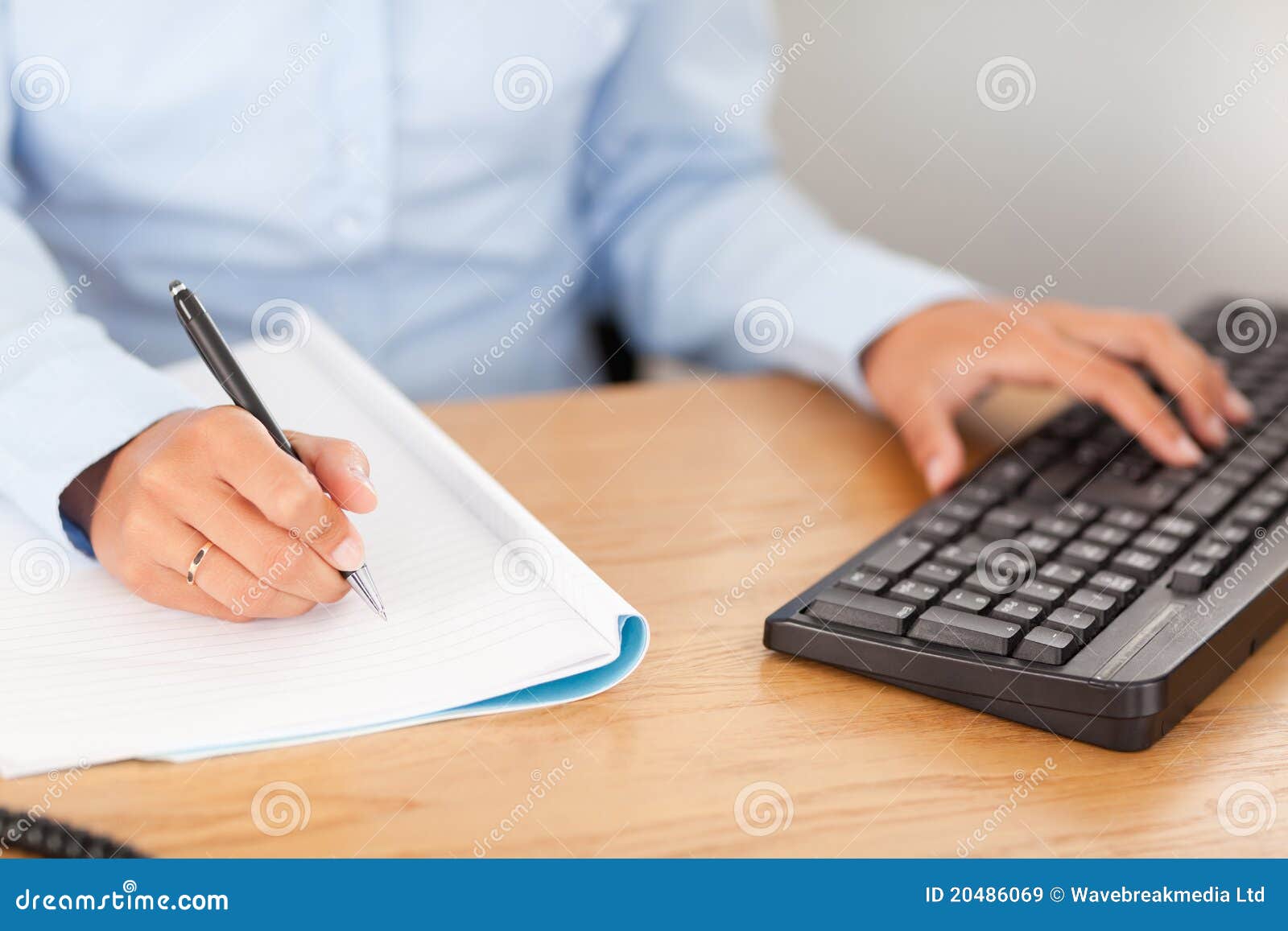 Gorgeous Businesswoman Typing and Writing Stock Image - Image of ...