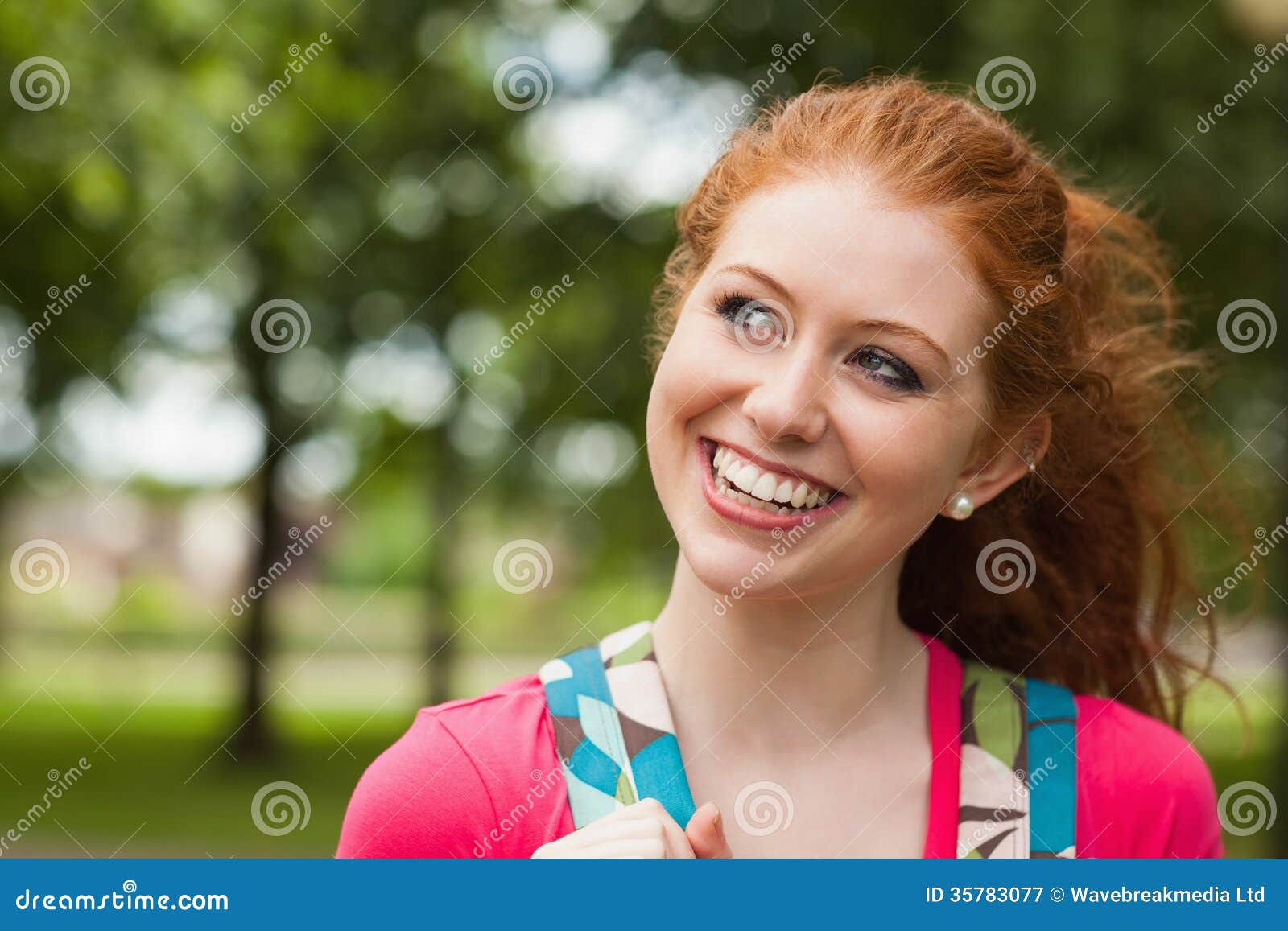 Gorgeous Cheerful Student Looking Up Stock Image - Image of long, lawn ...