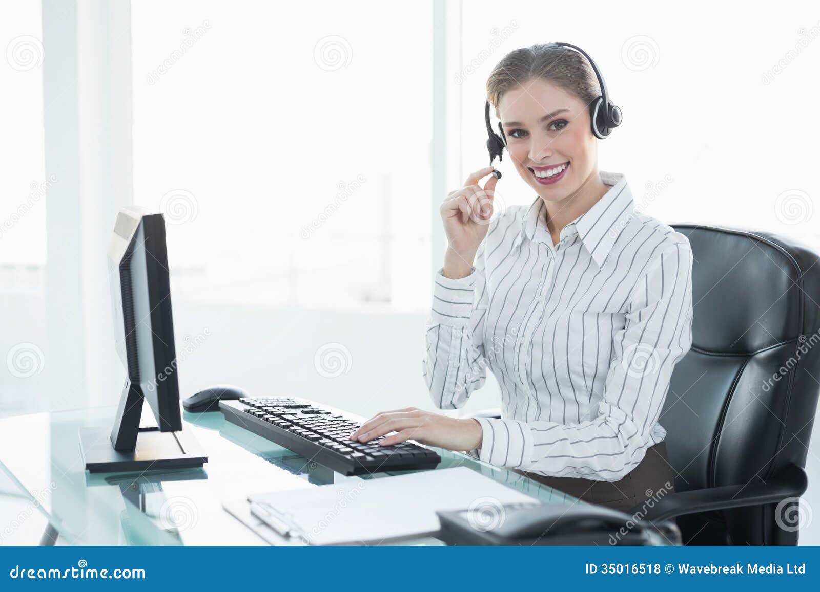 Gorgeous Chic Agent Wearing Headset Sitting at Her Desk Stock Photo ...