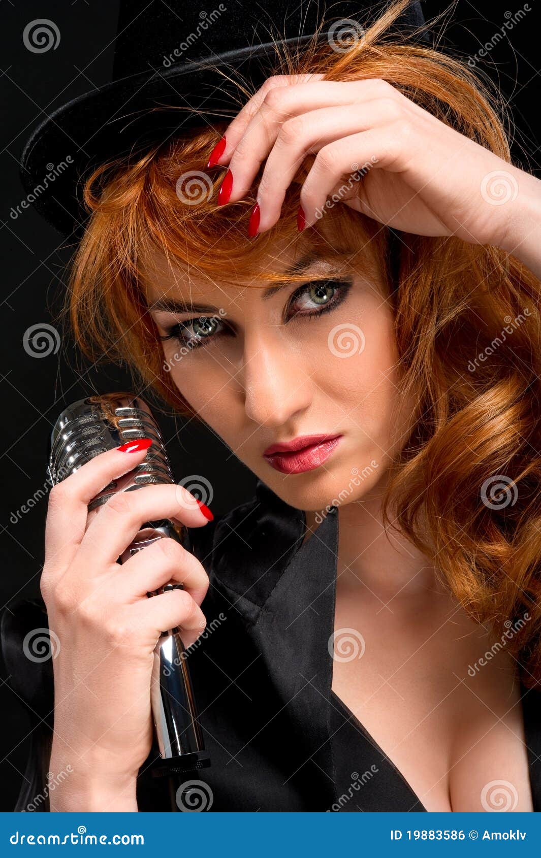 Gorgeous redhead singer stock photo. Image of hair, holding - 19883586
