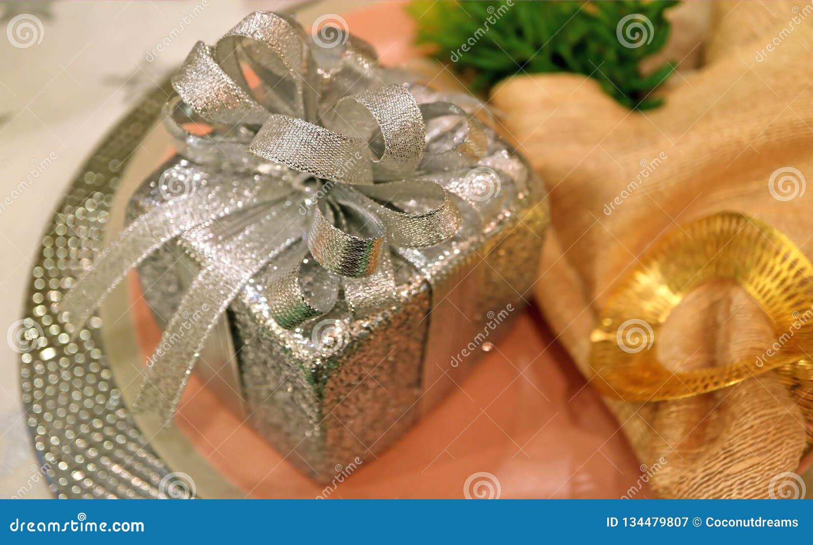 Gorgeous Silver Glitter Square Shaped Gift Box on the Silver Plate ...