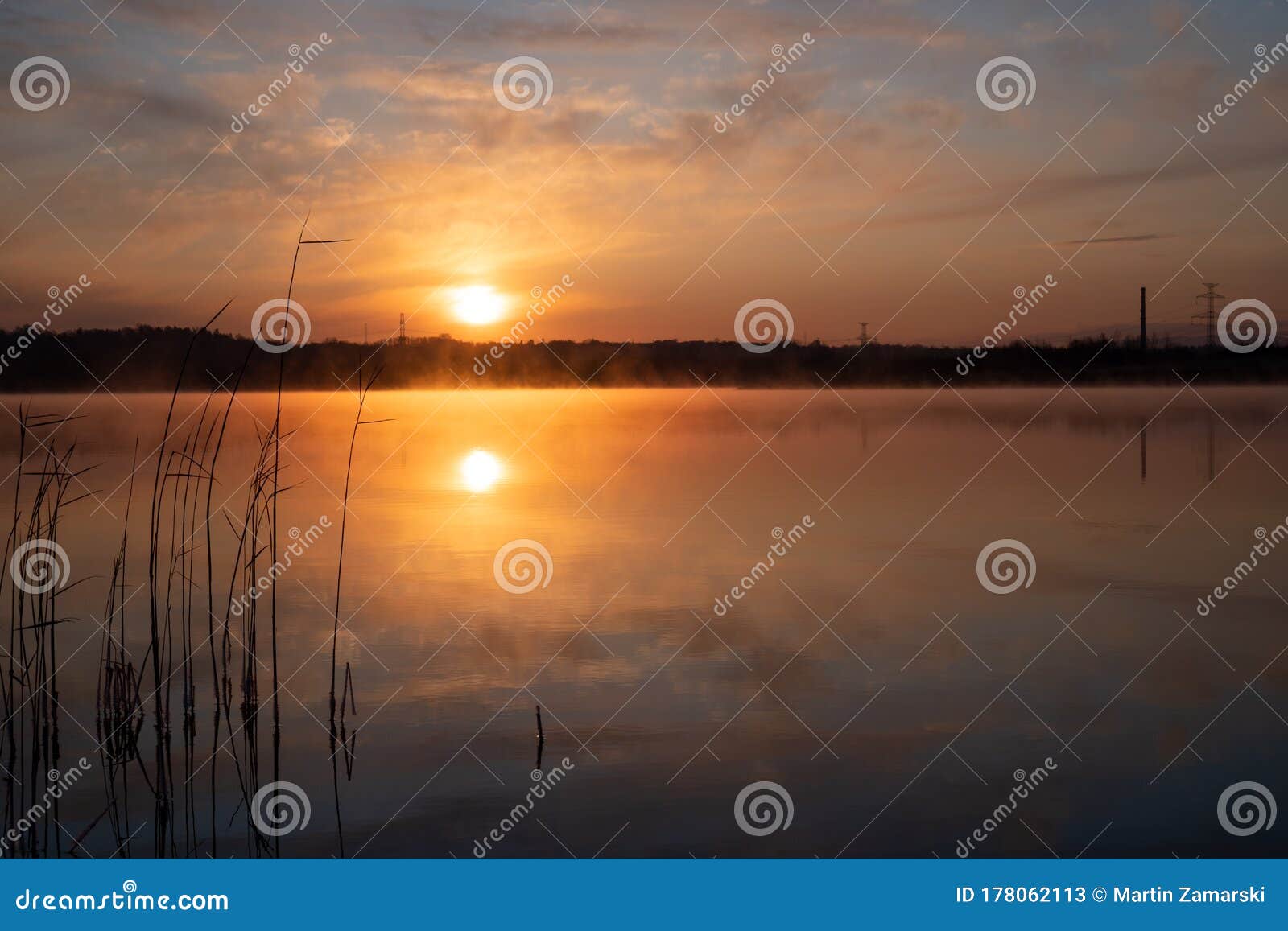 Gorgeous Sunrise Over the Lake with Reflection of the Sun on the Lake ...