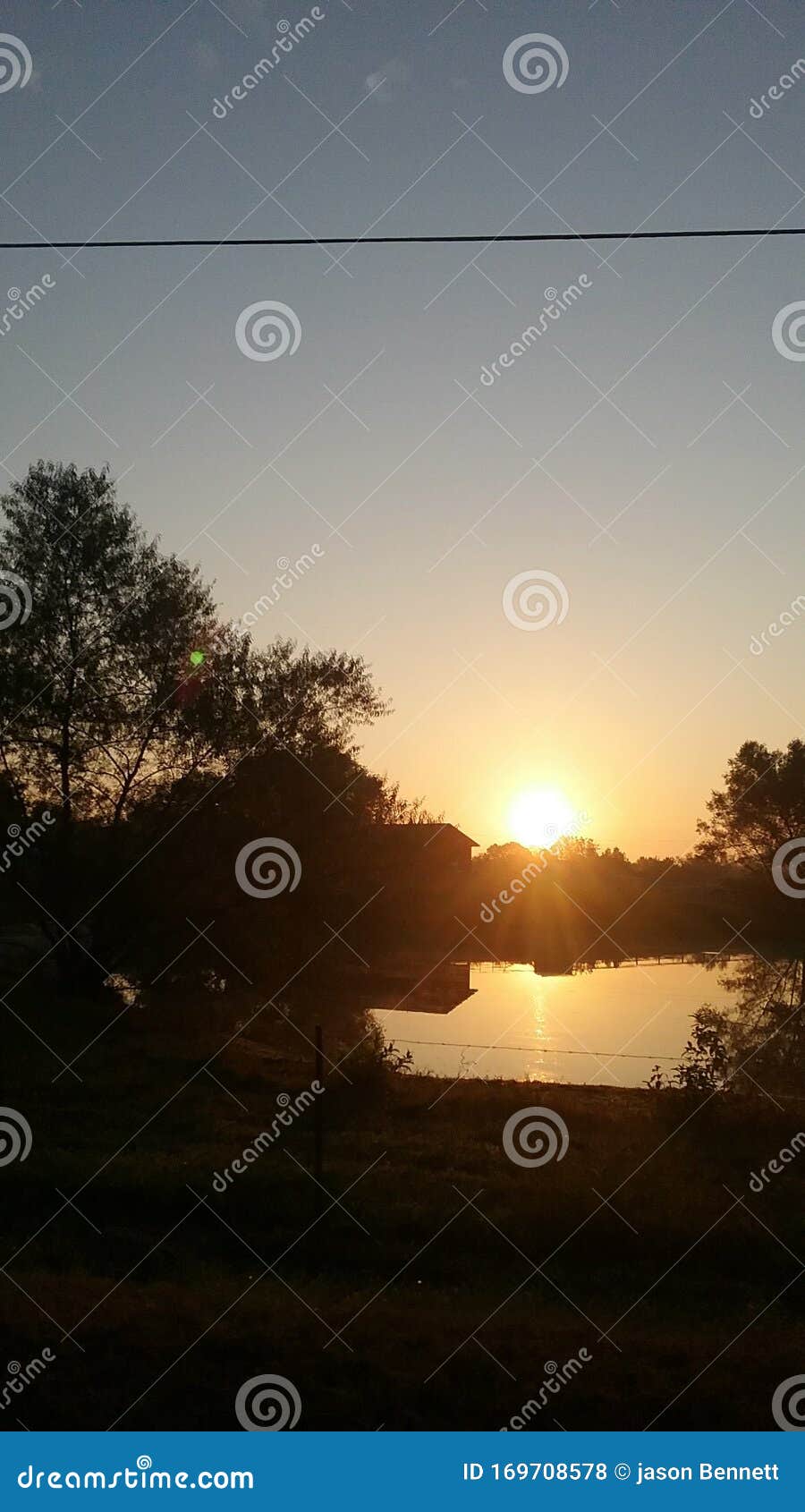 Gorgeous sunrise over pond stock photo. Image of sunrise - 169708578