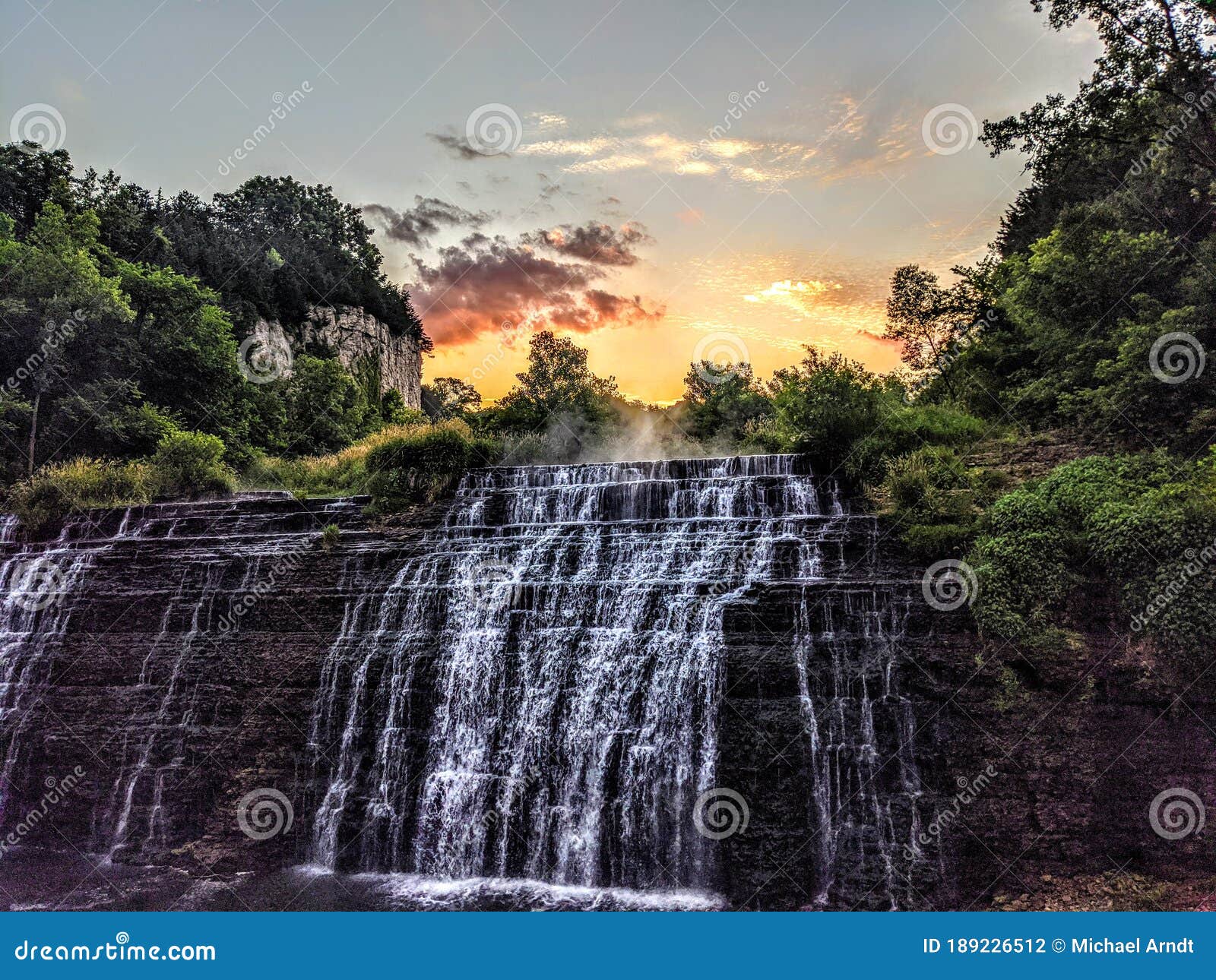 Gorgeous Sunrise Over a Waterfall Stock Photo - Image of leaf, gorgeous ...