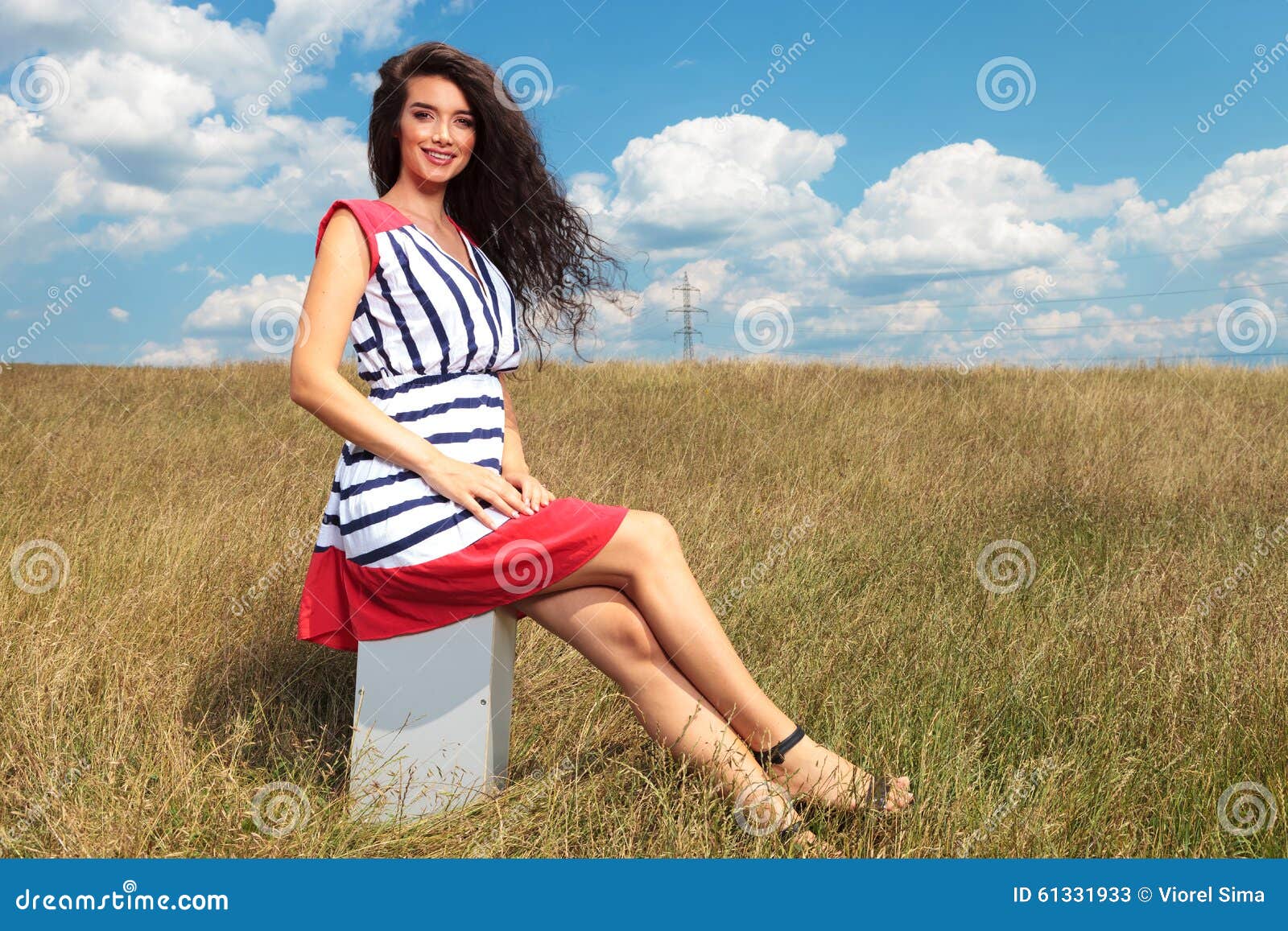 Gorgeous Young Lady Sitting Stock Image - Image of seated, female: 61331933