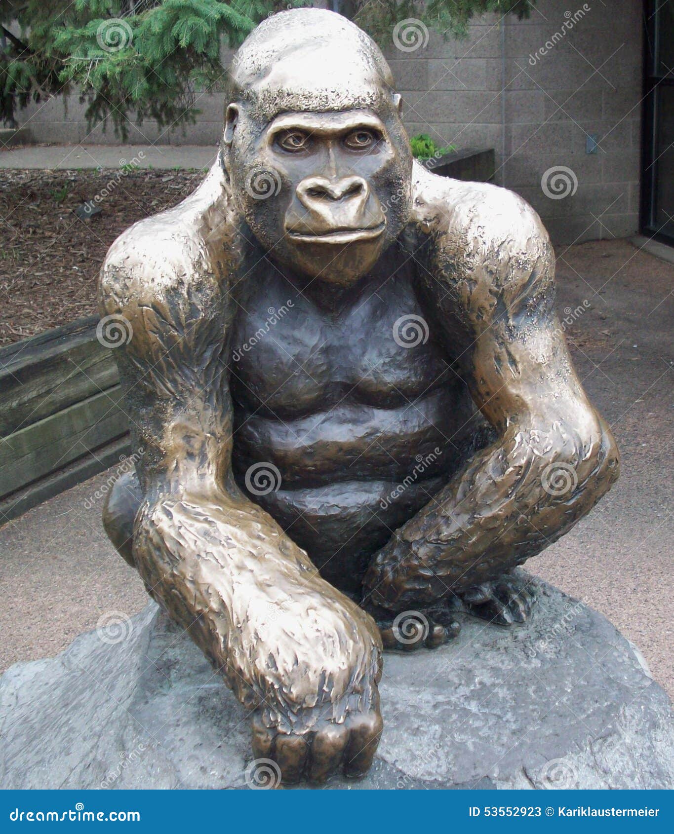 Gorilla Statue Sitting On The Bench. Ape Sculpture On The Beach Of ...