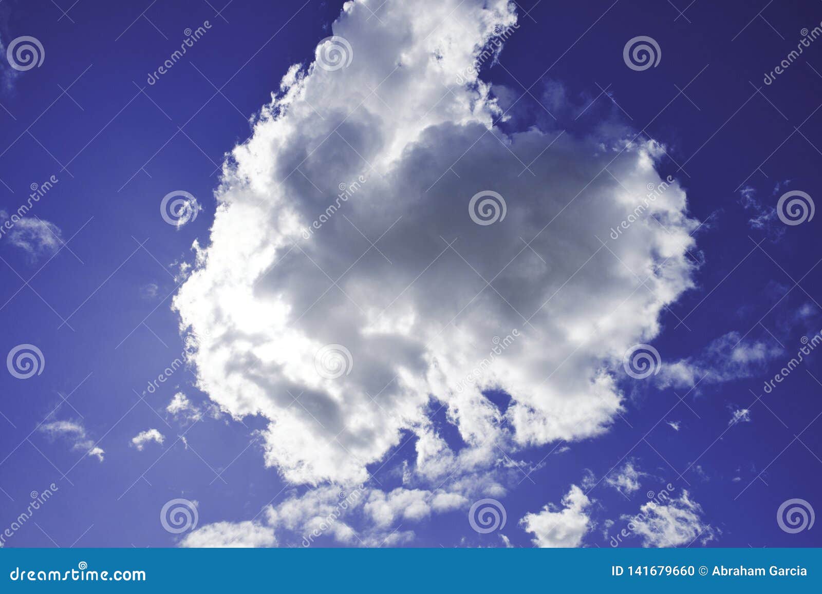 Got Out of Work and Saw this Single Cloud Blocking the Sun Stock Photo ...