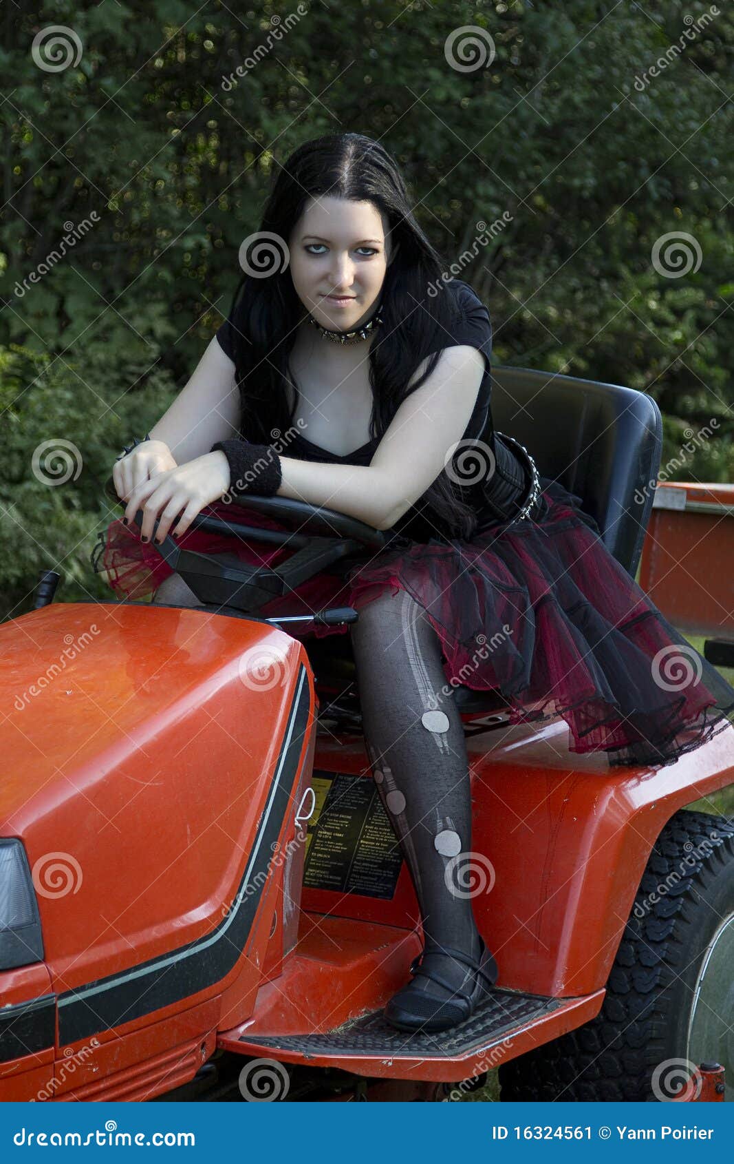 Goth girl on a tractor stock image. Image of grass, goth - 16324561