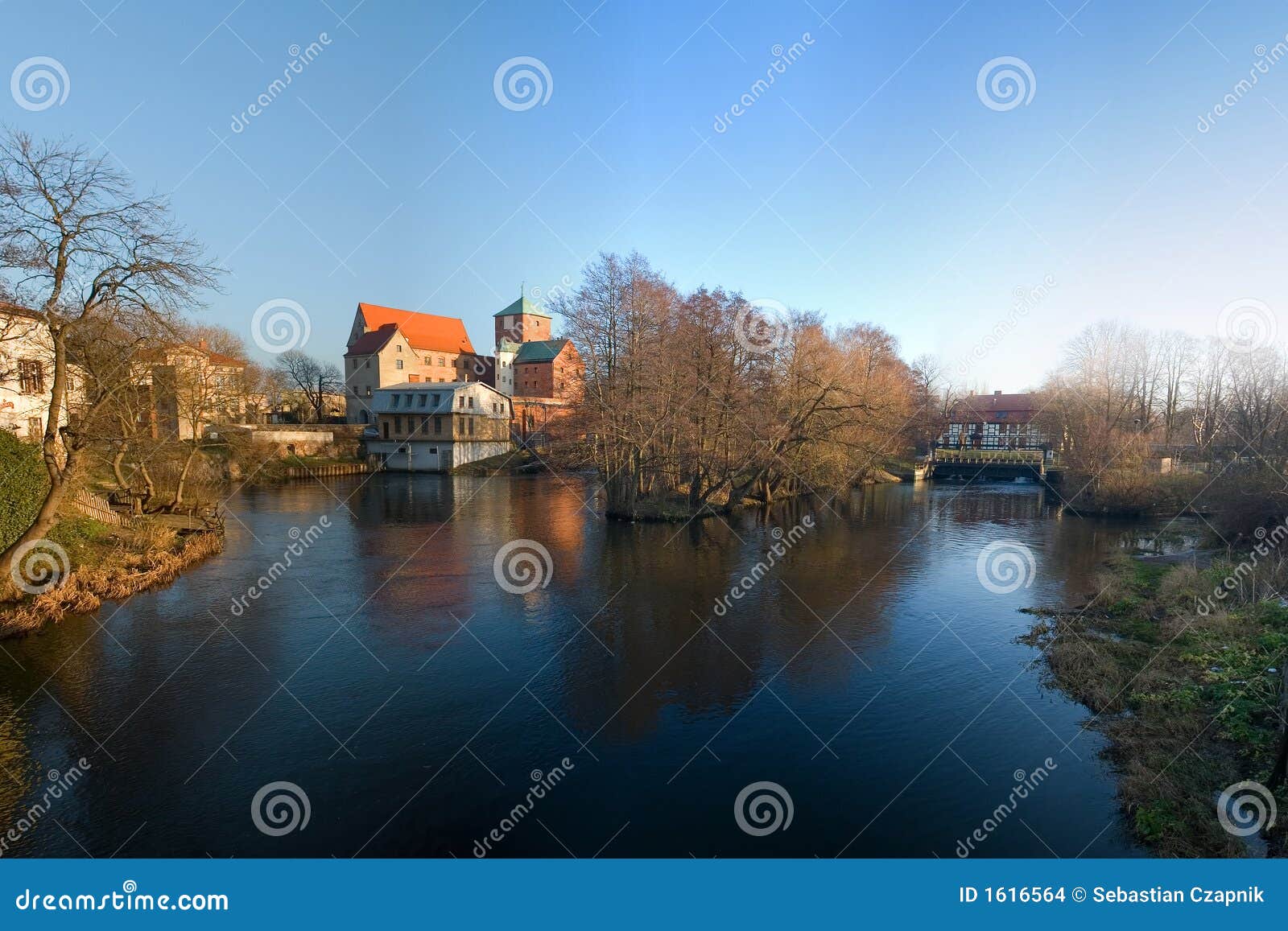 Gothic castle by a river stock photo. Image of mirror - 1616564