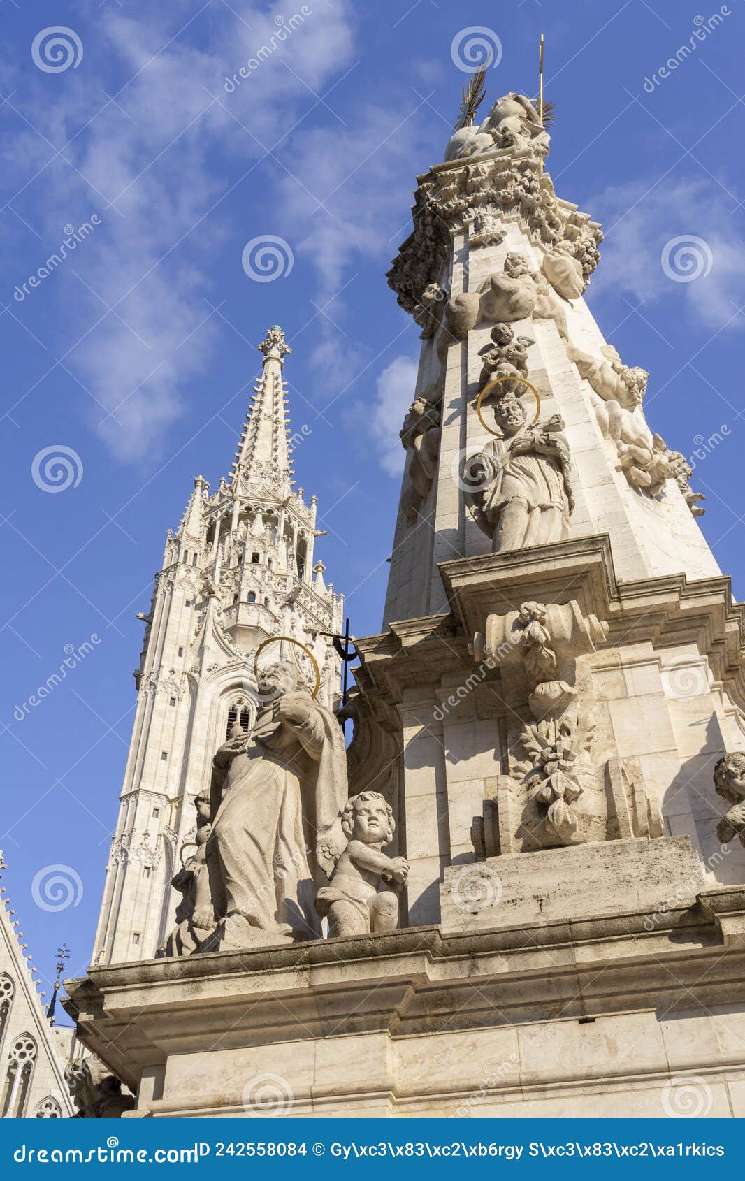 Gothic Cathedral Tower and a Religious Statue Stock Photo - Image of ...