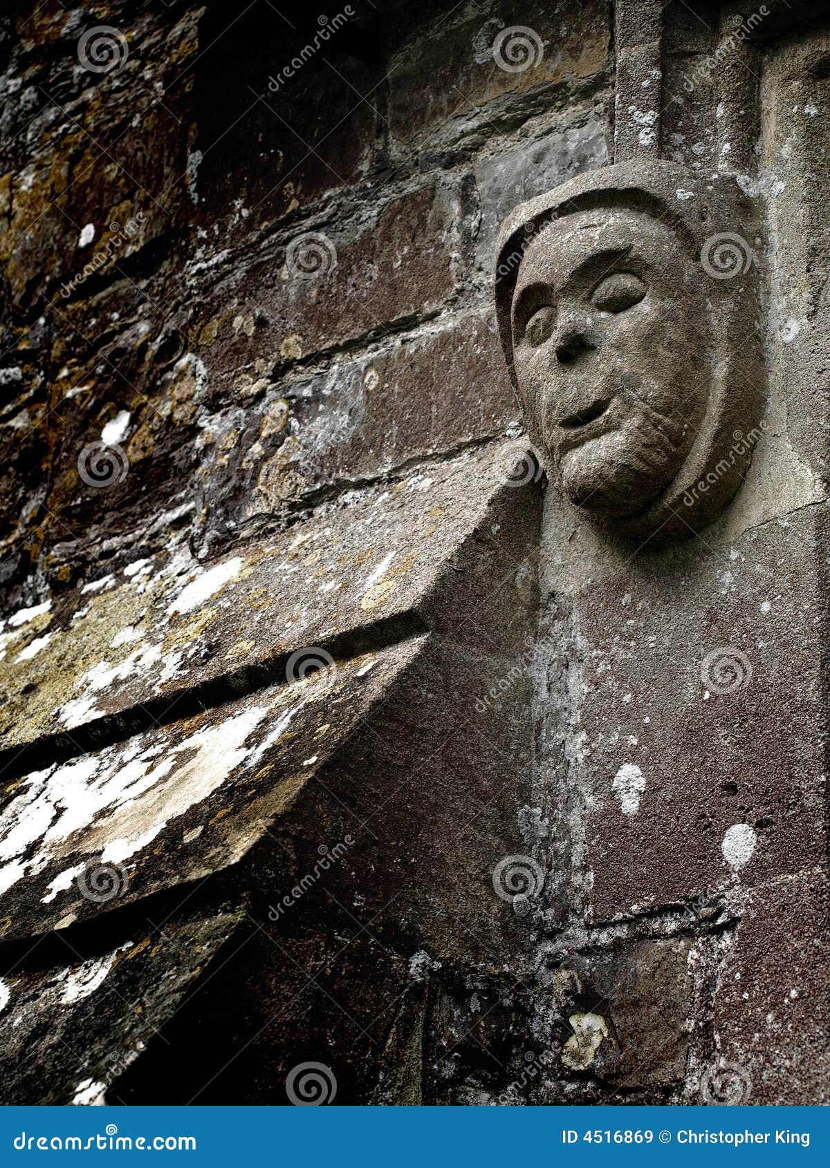 Gothic Smiley Stone Face on a Church Wall Stock Image - Image of creepy ...