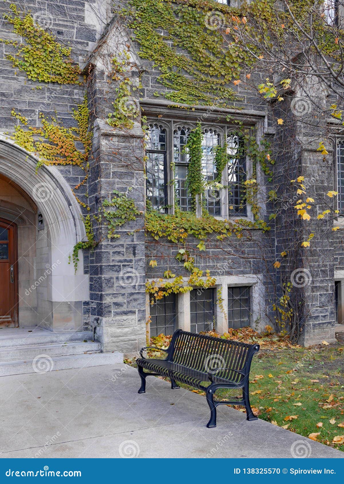 Gothic Style Stone College Building with Bench Stock Photo - Image of ...