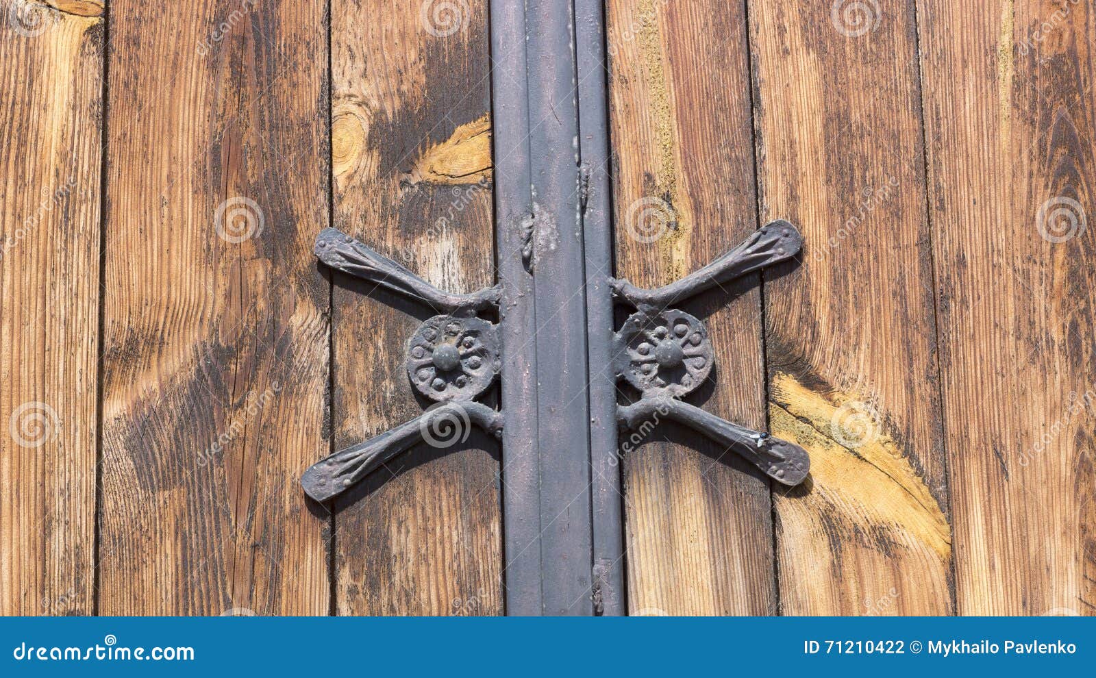 Gothic Wrought Iron Elements on the Wooden Plank Gate Stock Photo ...