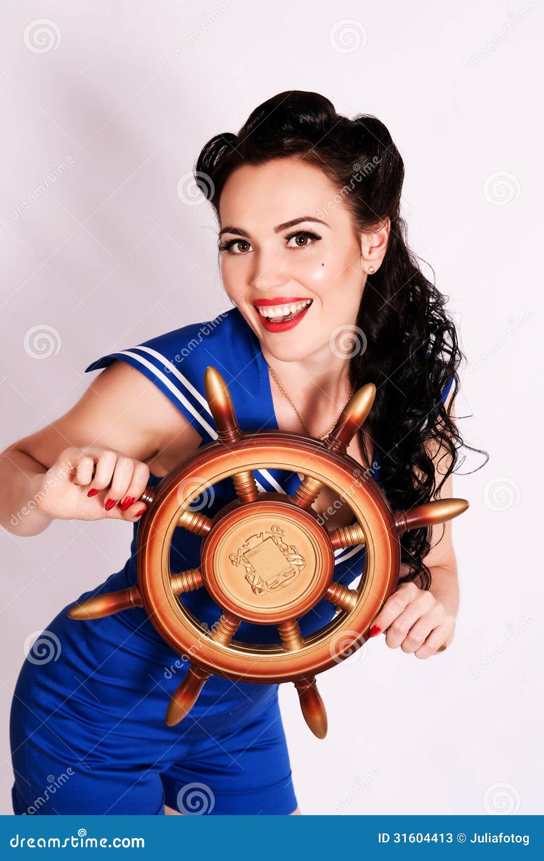 Goupille De Marin Vers Le Haut De Fille Avec Le Volant Image Stock