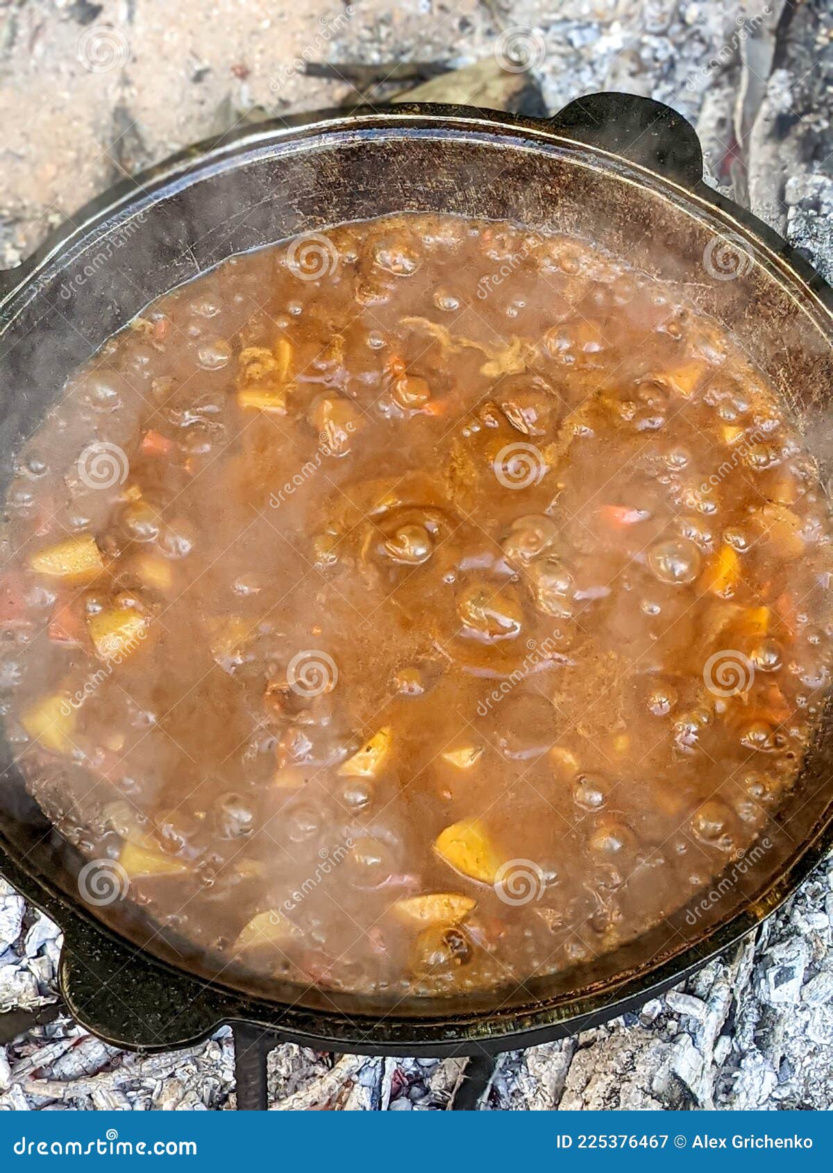 Gourmet Beef Stew Cooked in Cauldron on Outdoor Fire Pit Stock Image ...