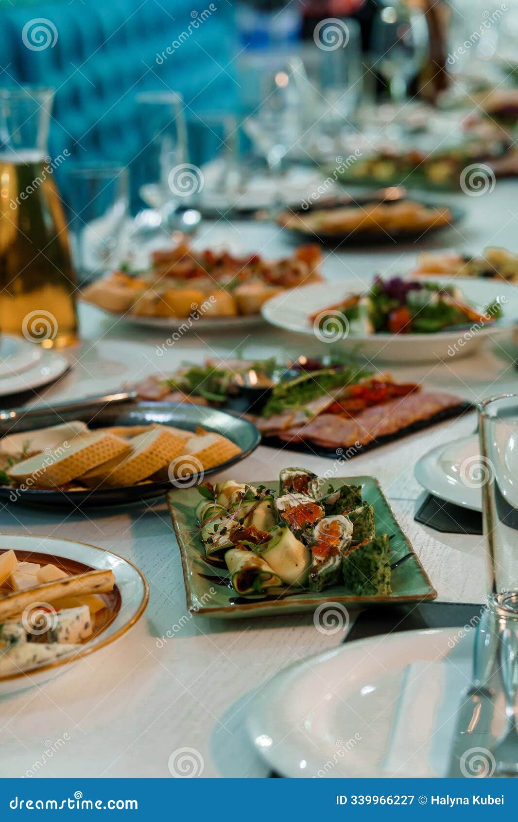 Gourmet Feast Setup with Assorted Dishes and Elegant Tableware Stock ...