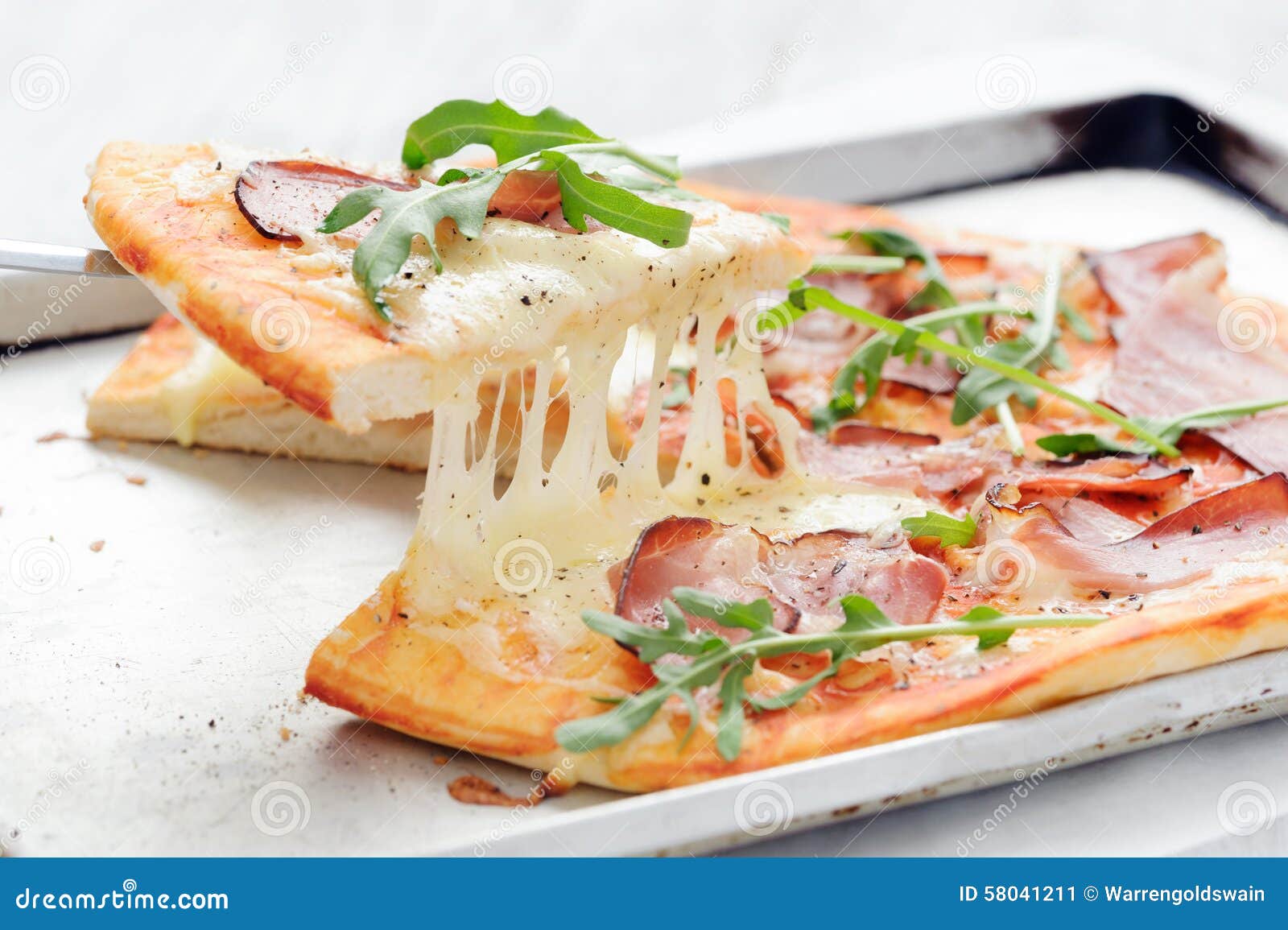 Gourmet Rustic Pizza Lifted Stock Image - Image of snack, foot: 58041211