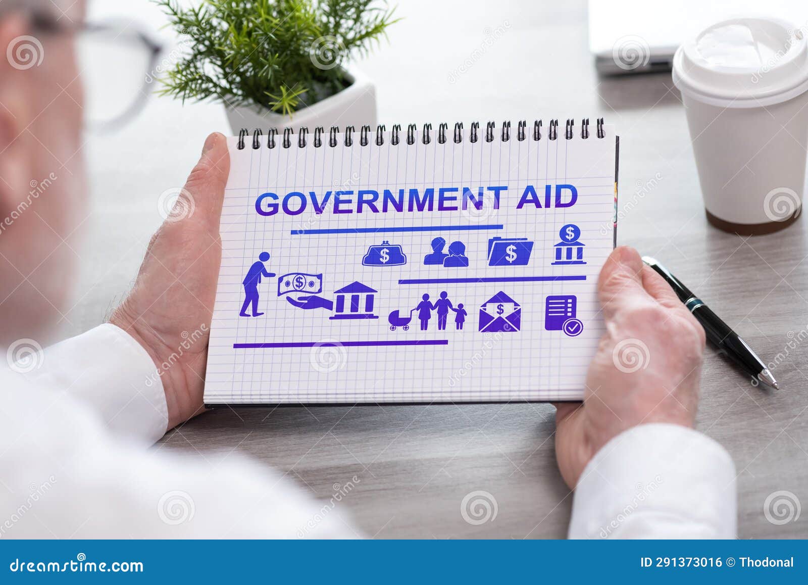 Government Aid Concept on a Notepad Stock Photo - Image of finance ...