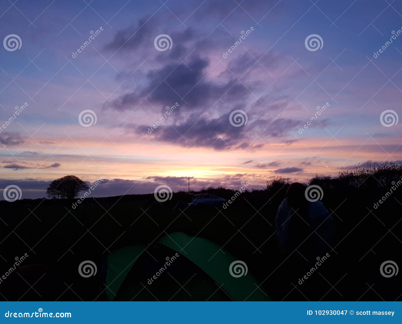 Gower Peninsula sunset stock image. Image of gower, tents - 102930047