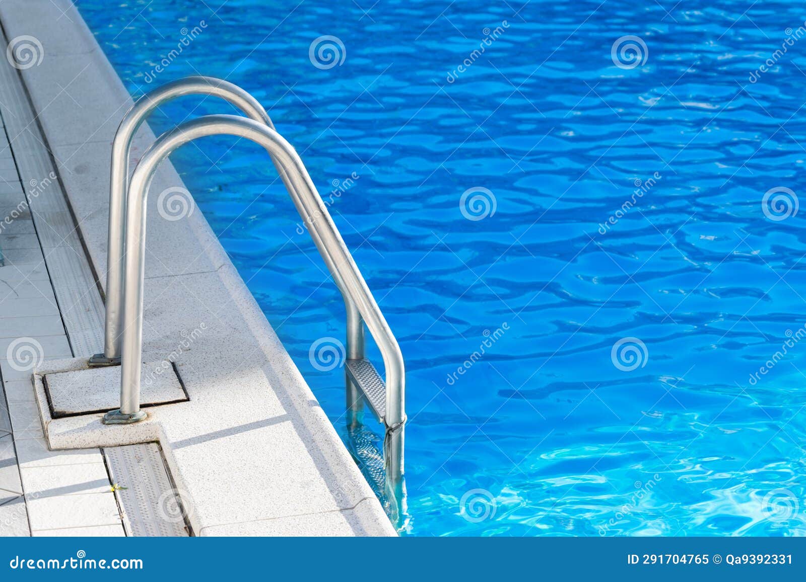 Grab Bars Ladder in the Blue Swimming Pool Stock Image - Image of ...