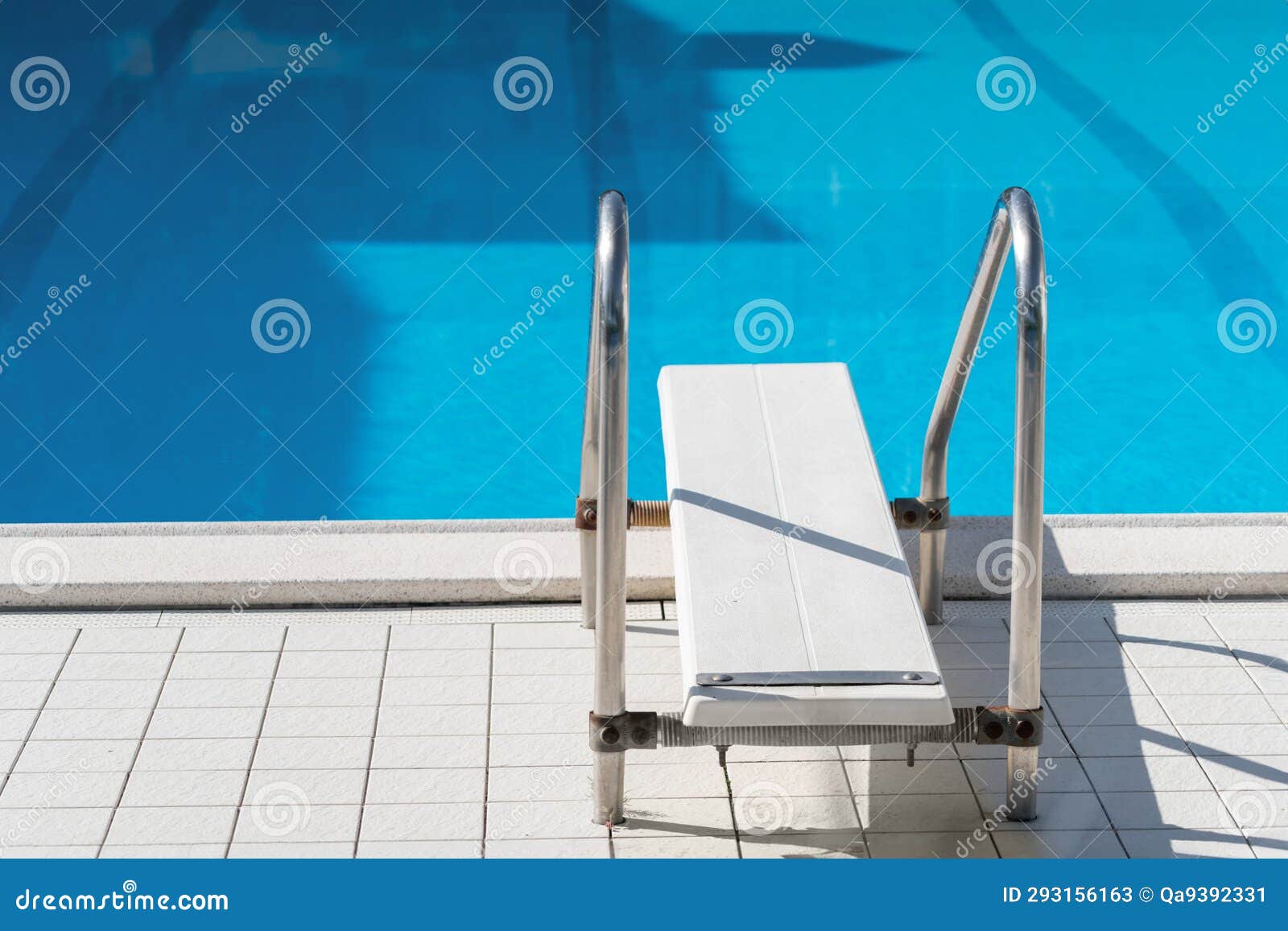 Grab Bars Ladder in the Blue Swimming Pool Stock Image - Image of ...