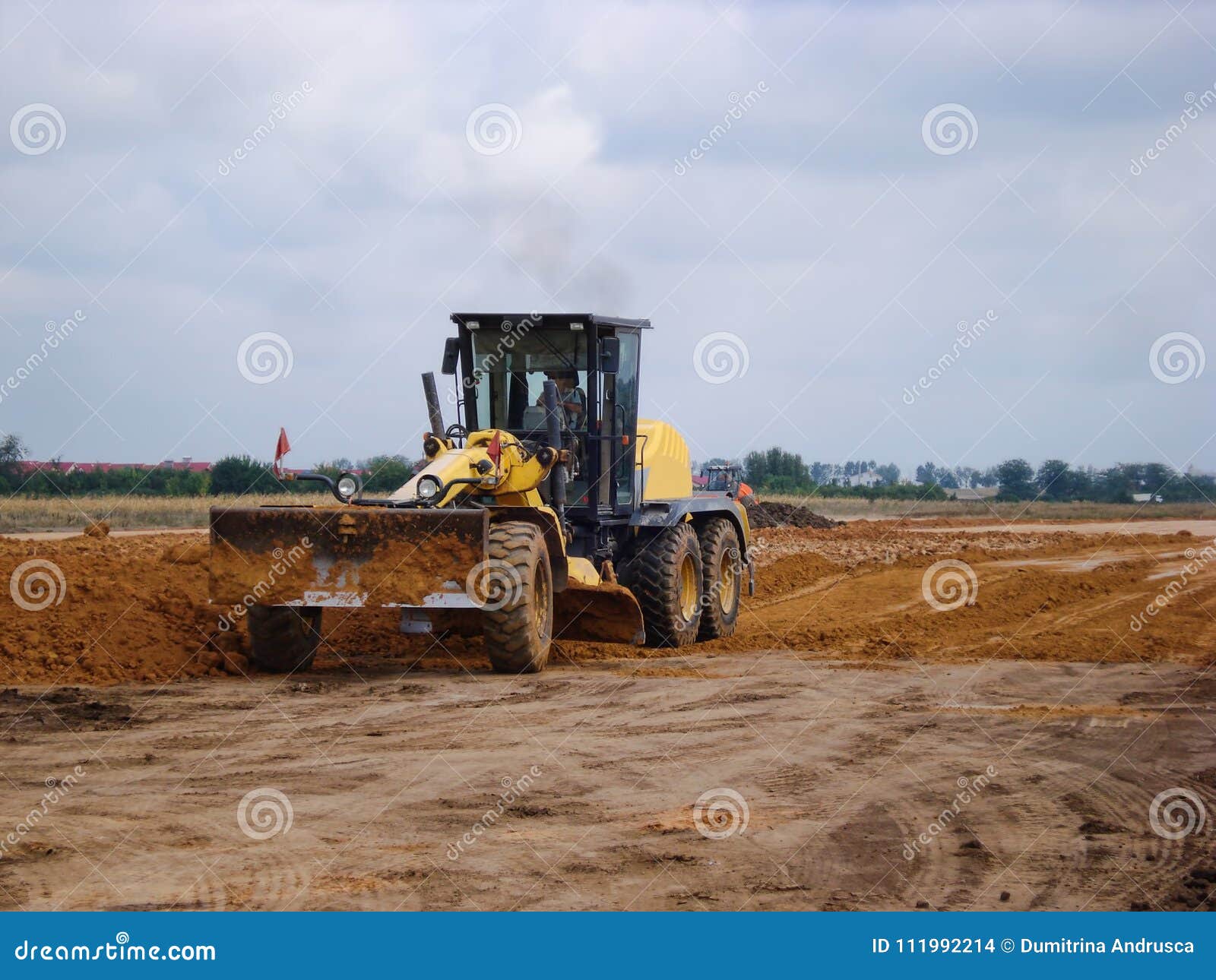 Yellow grader machinery stock photo. Image of large - 111992214