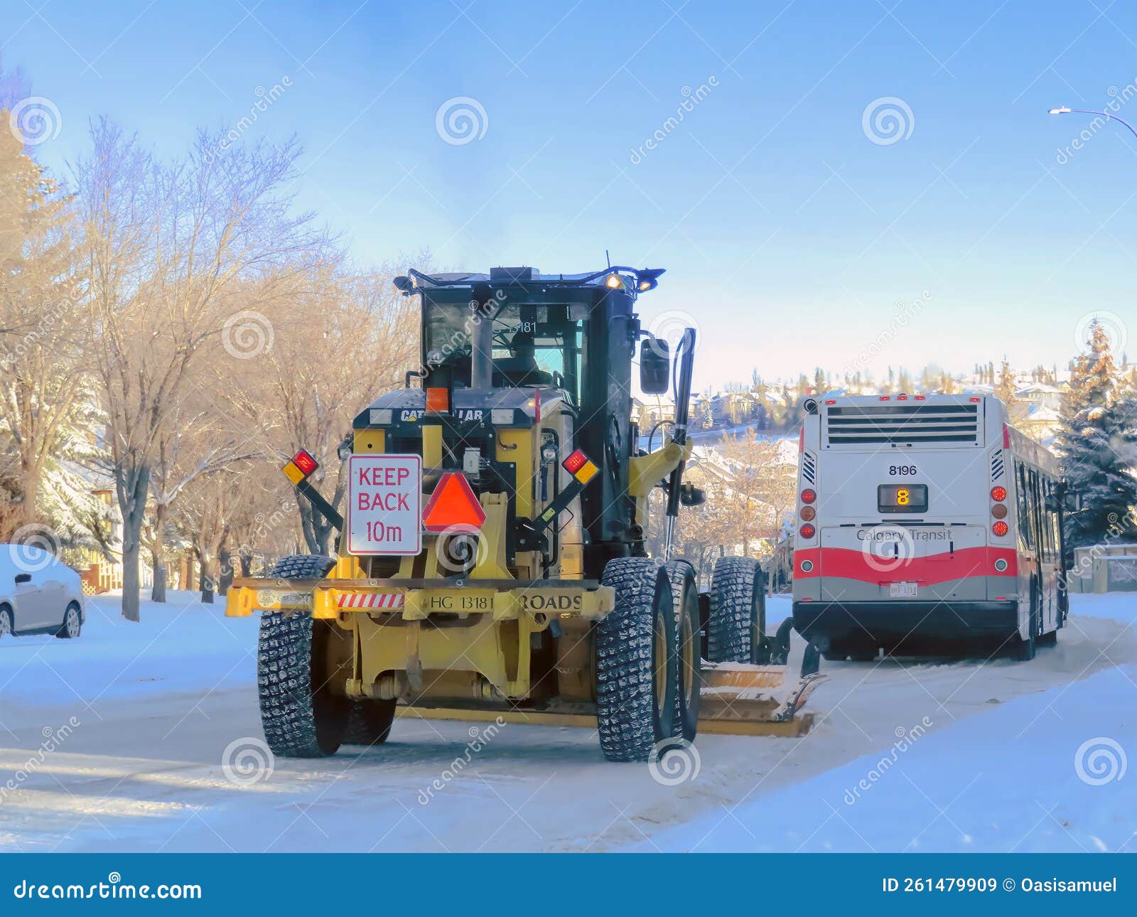 A Grader Clearing the Snow after a Snowfall during Winter. Concept ...