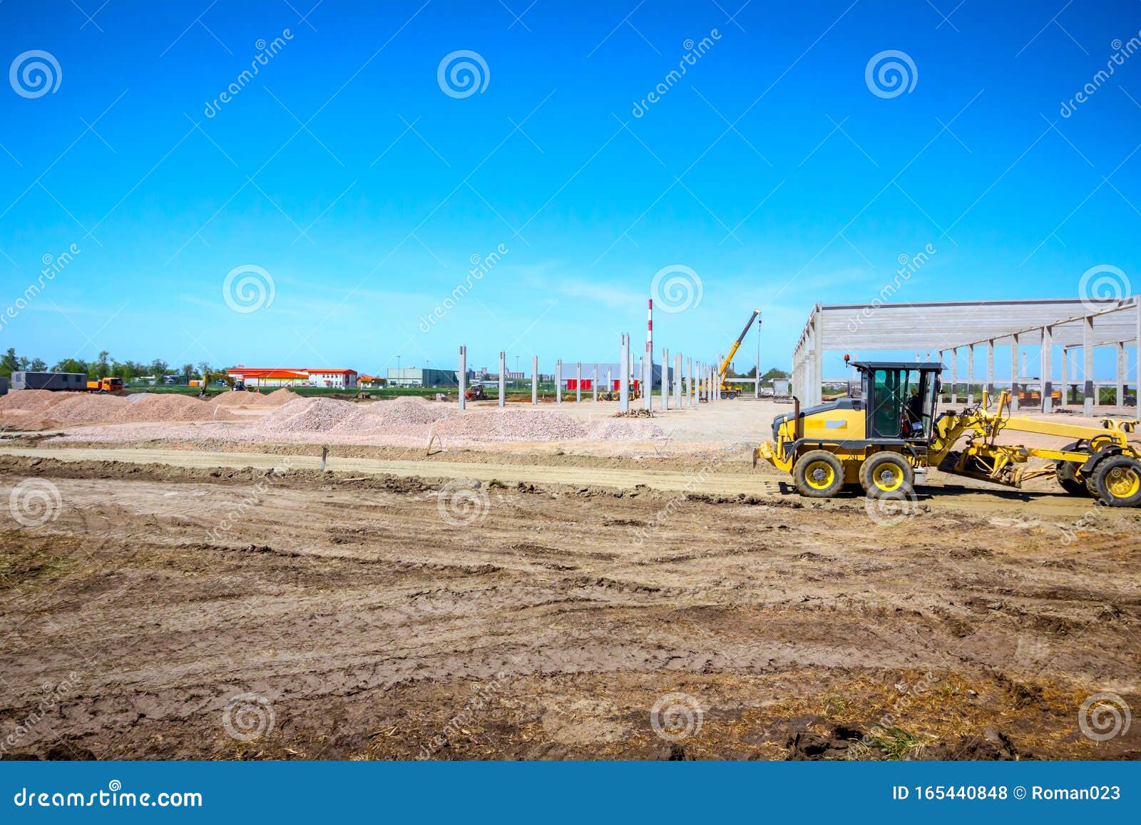 Grader is Leveling Ground at Construction Site Stock Photo - Image of ...