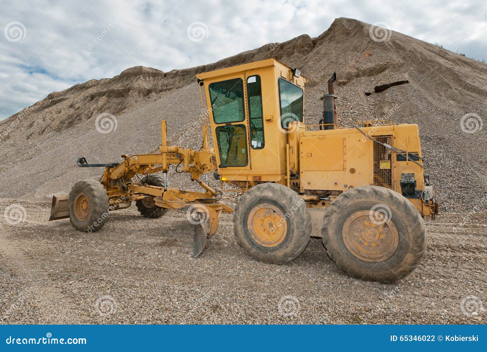 Grader for Road Construction in a Gravel Pit Stock Photo - Image of ...