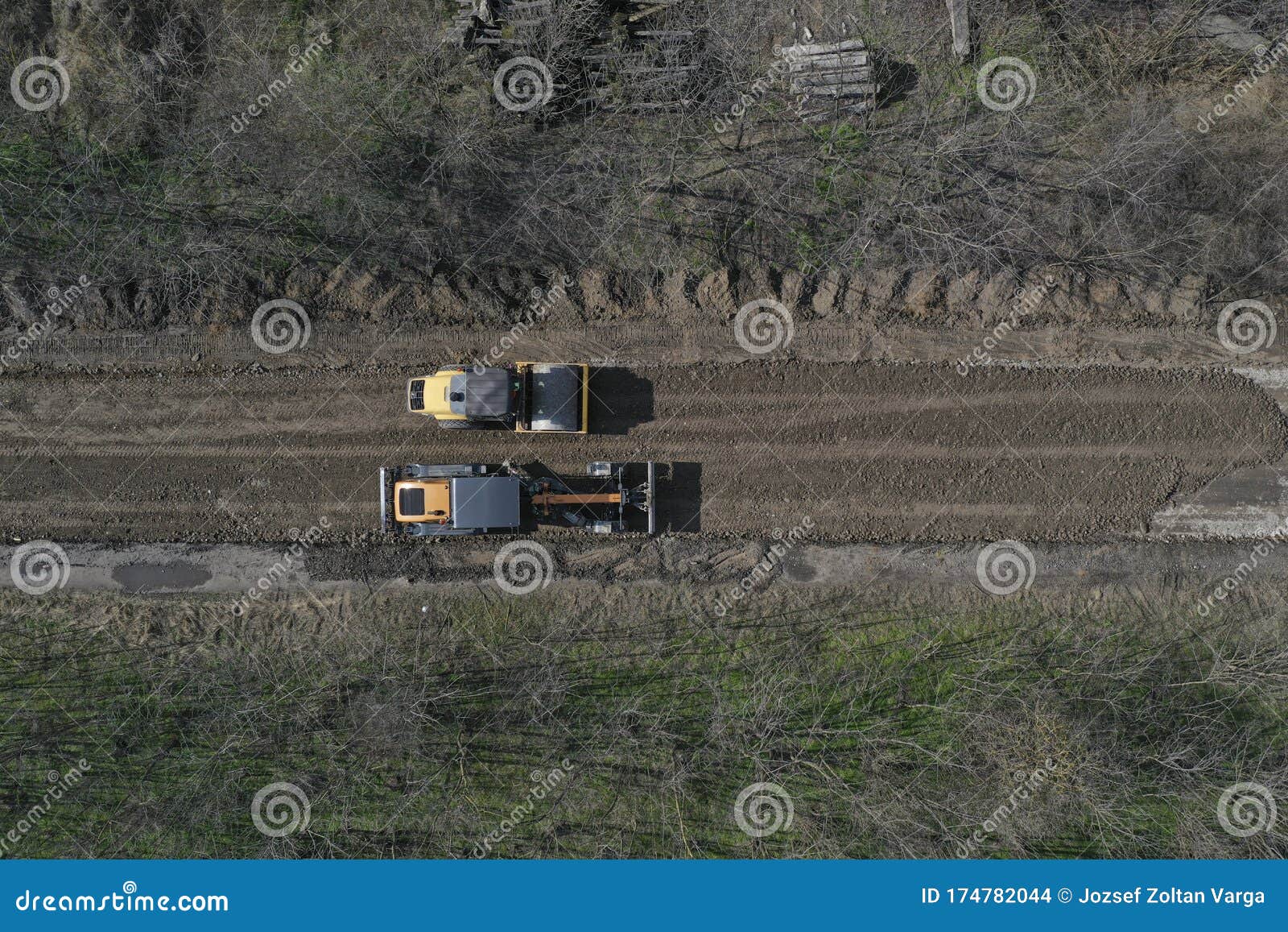 Grader Road Construction. a Motor Grader Works on a Site on a Road ...