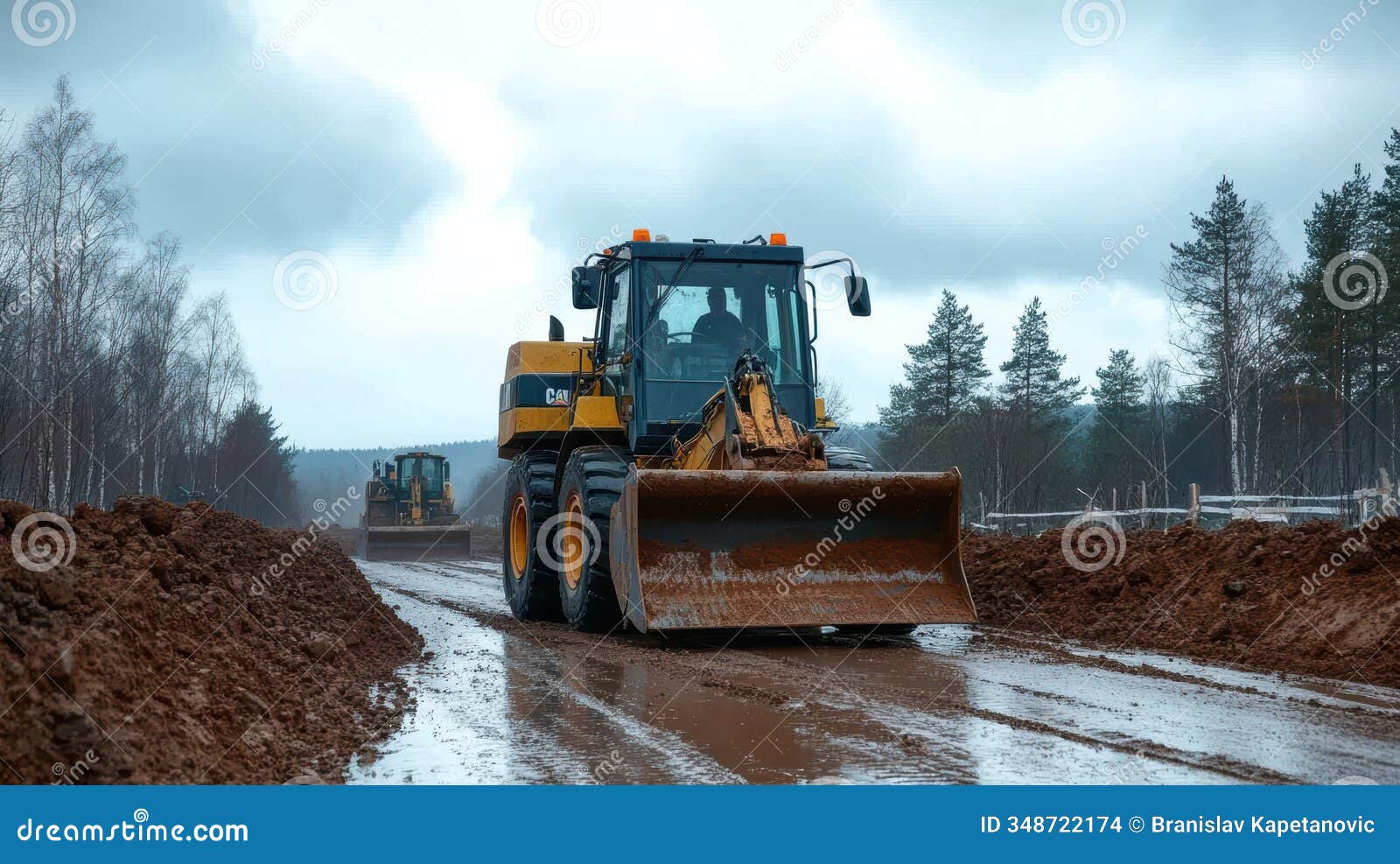 Grader and Wheel Loader Working on Highway Construction Site Stock ...