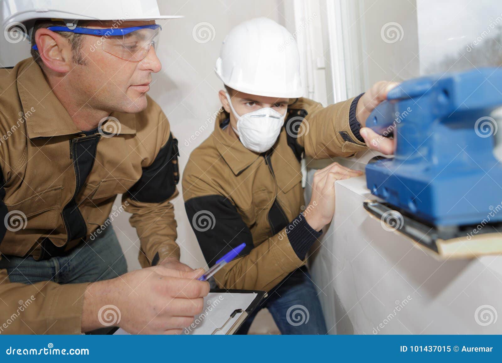 Grading Young Builders Performance Stock Image - Image of male, goggles ...