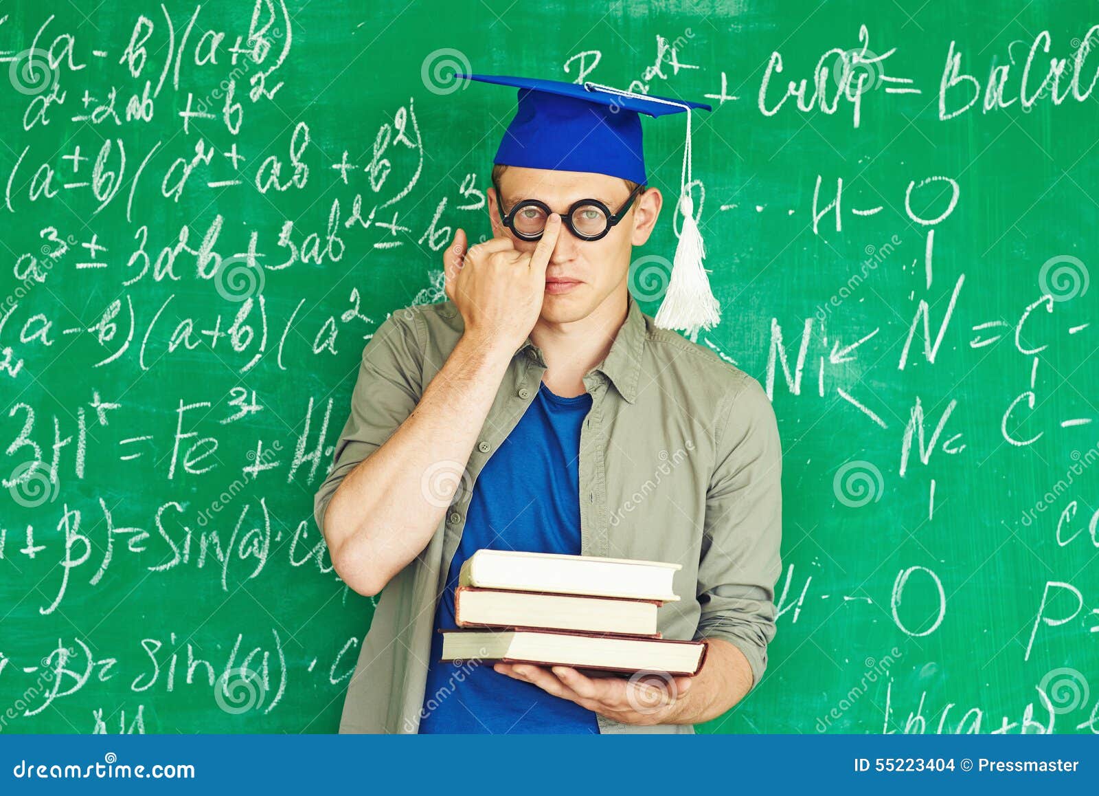 Graduate in eyeglasses stock photo. Image of highschool - 55223404