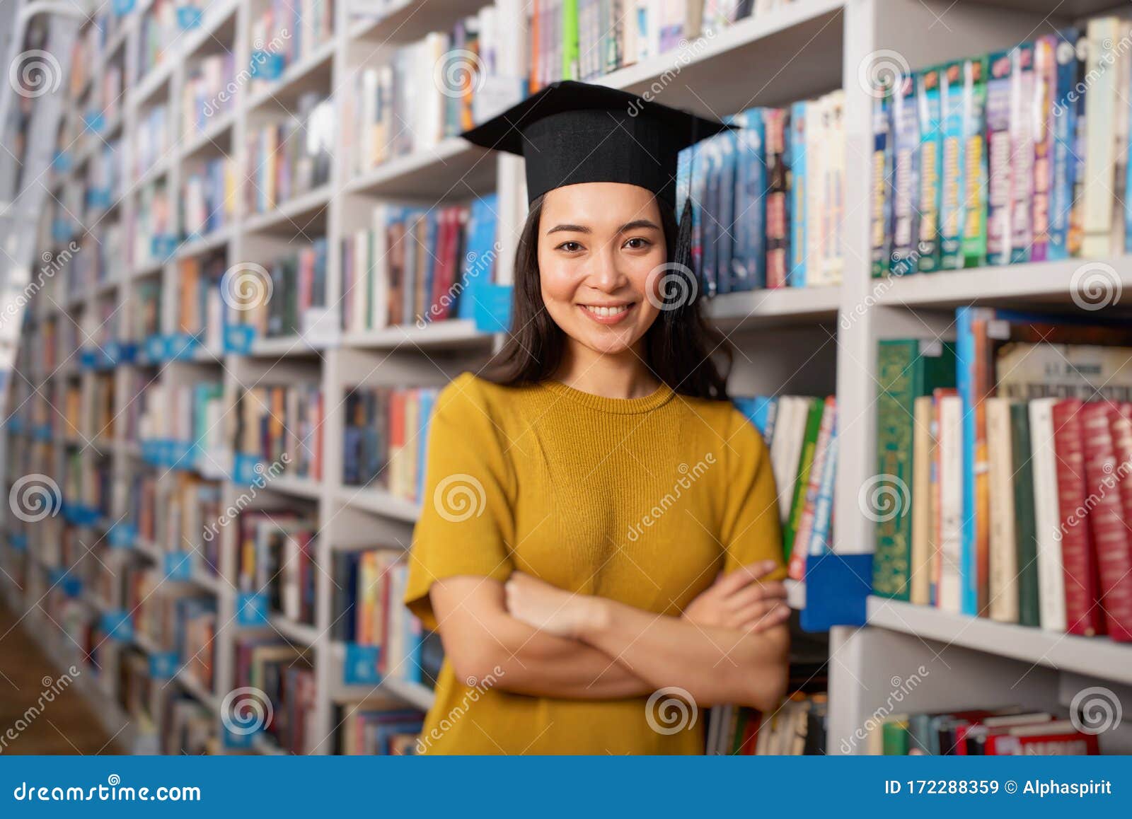 Graduate Girl in Front of a Library. Concept of Preparation and ...