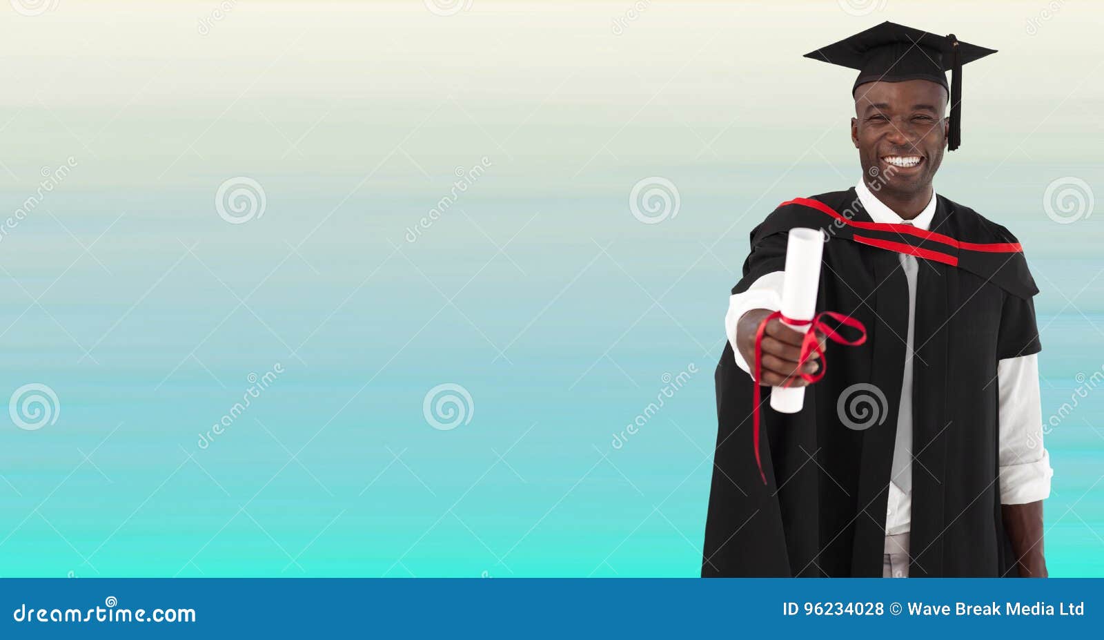 Graduate Man Smiling Against Blurry Blue Background Stock Photo - Image ...
