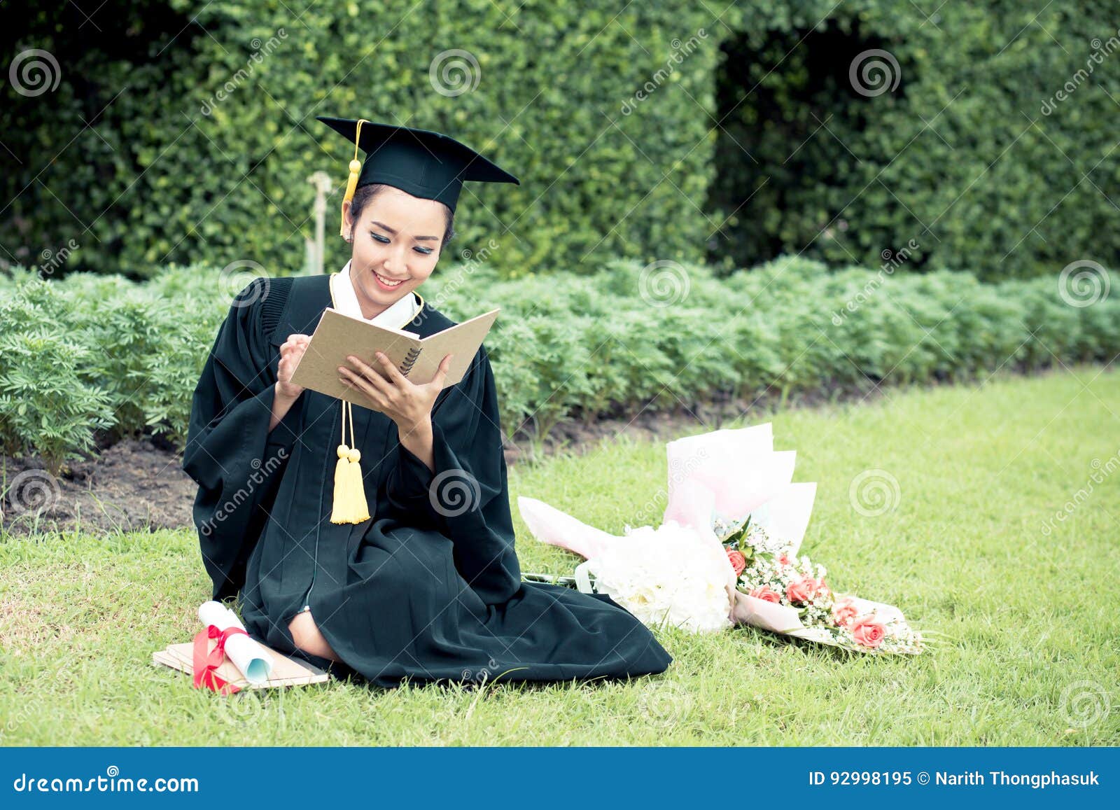 Graduate Reading Diary, Notebook in Her Hand Feeling Relaxing. Stock ...