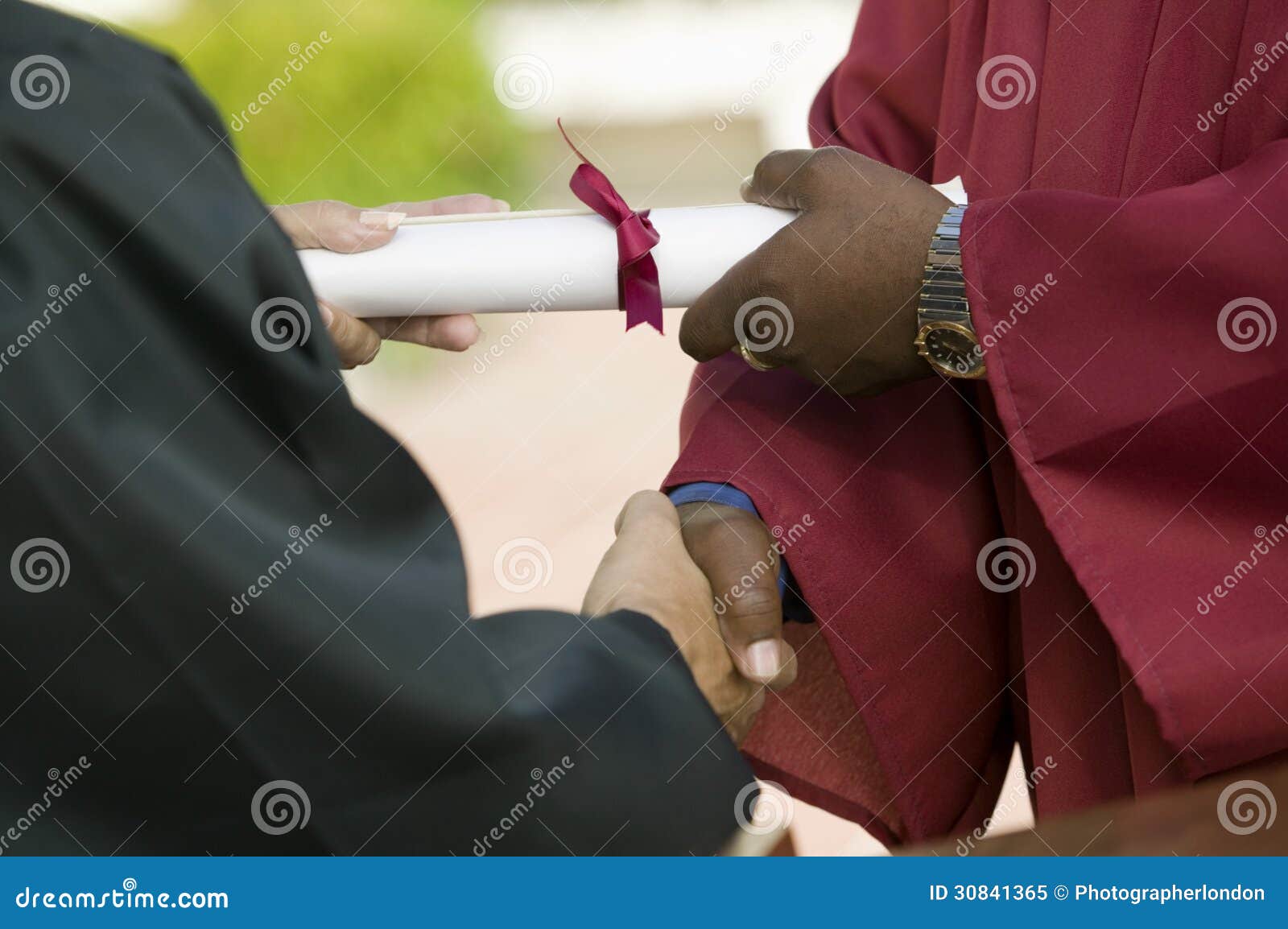 Graduate Receiving Diploma and Handshake Mid Section Stock Image ...