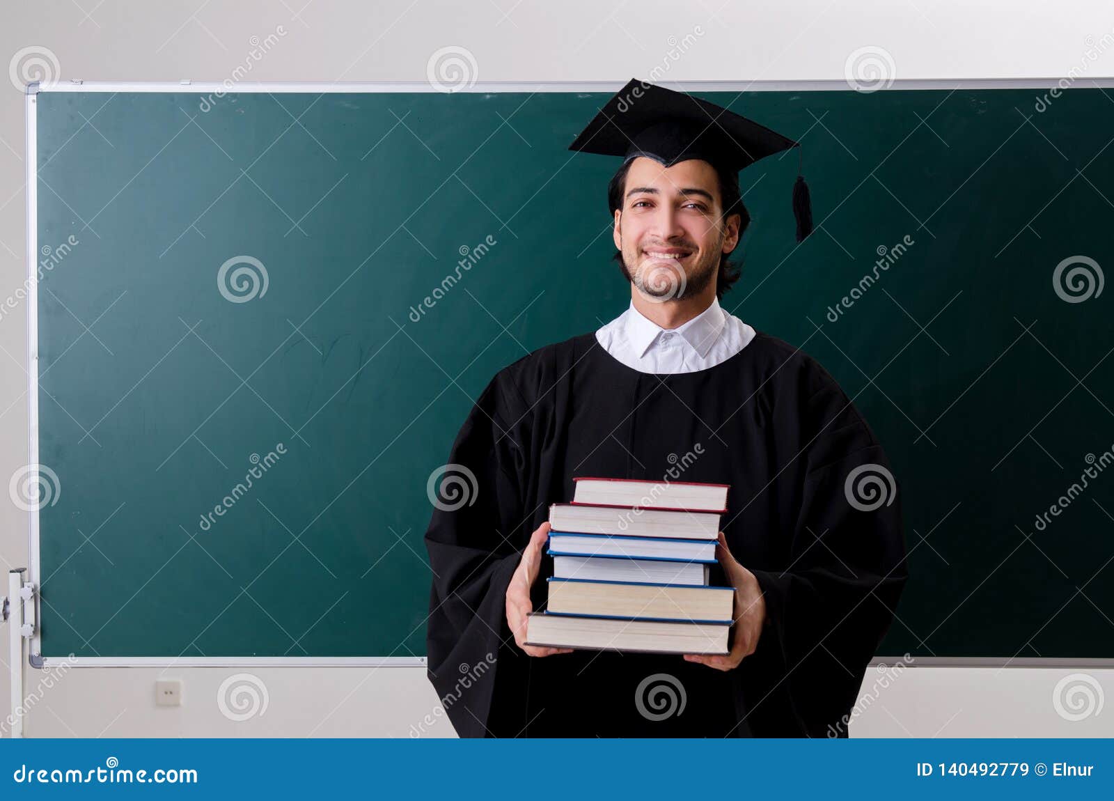 The Graduate Student in Front of Green Board Stock Image - Image of ...