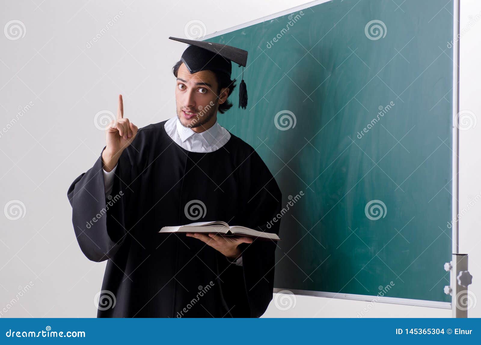 The Graduate Student in Front of Green Board Stock Photo - Image of ...