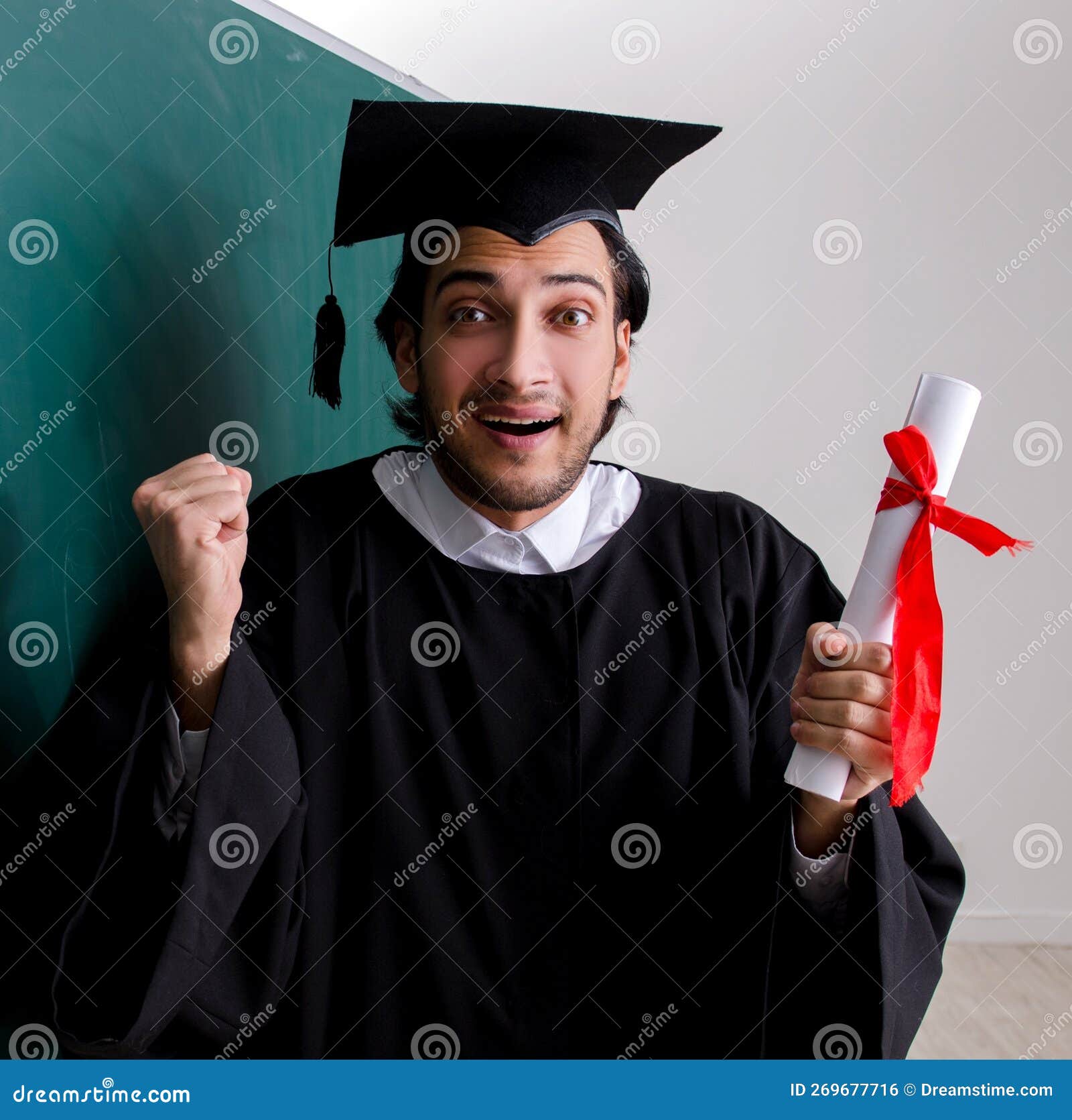 Graduate Student in Front of Green Board Stock Photo - Image of ...