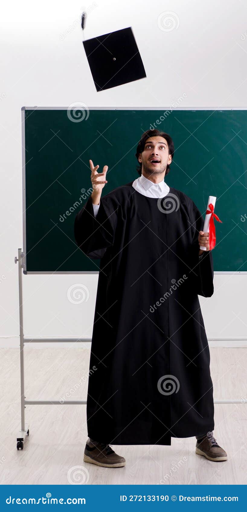 Graduate Student in Front of Green Board Stock Photo - Image of ...