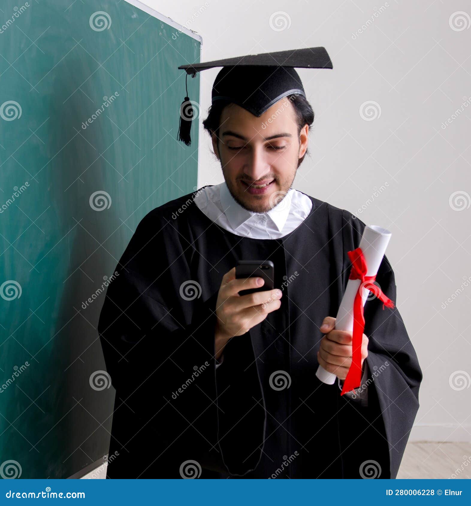 Graduate Student in Front of Green Board Stock Photo - Image of ...