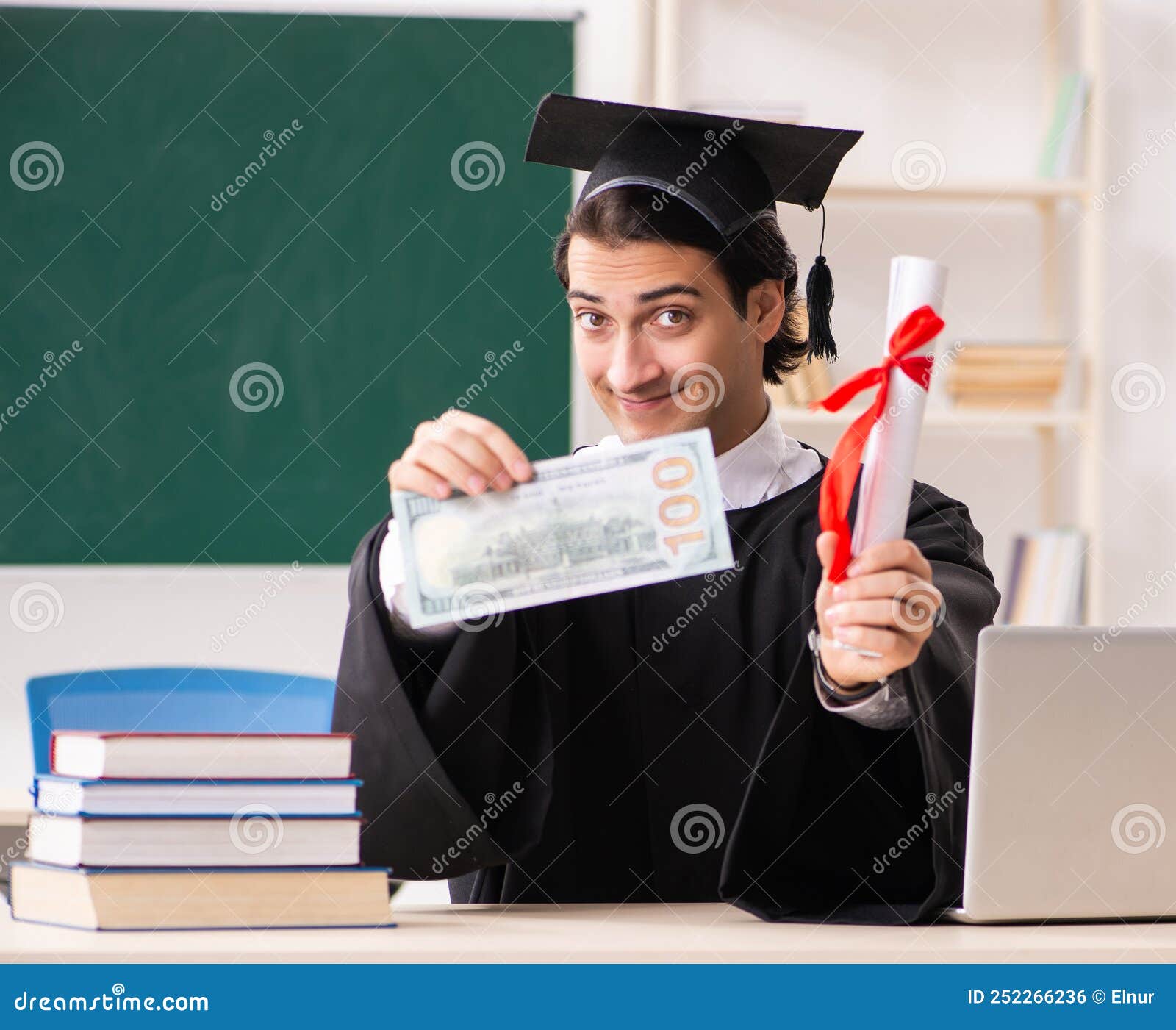Graduate Student in Front of Green Board Stock Photo - Image of ...
