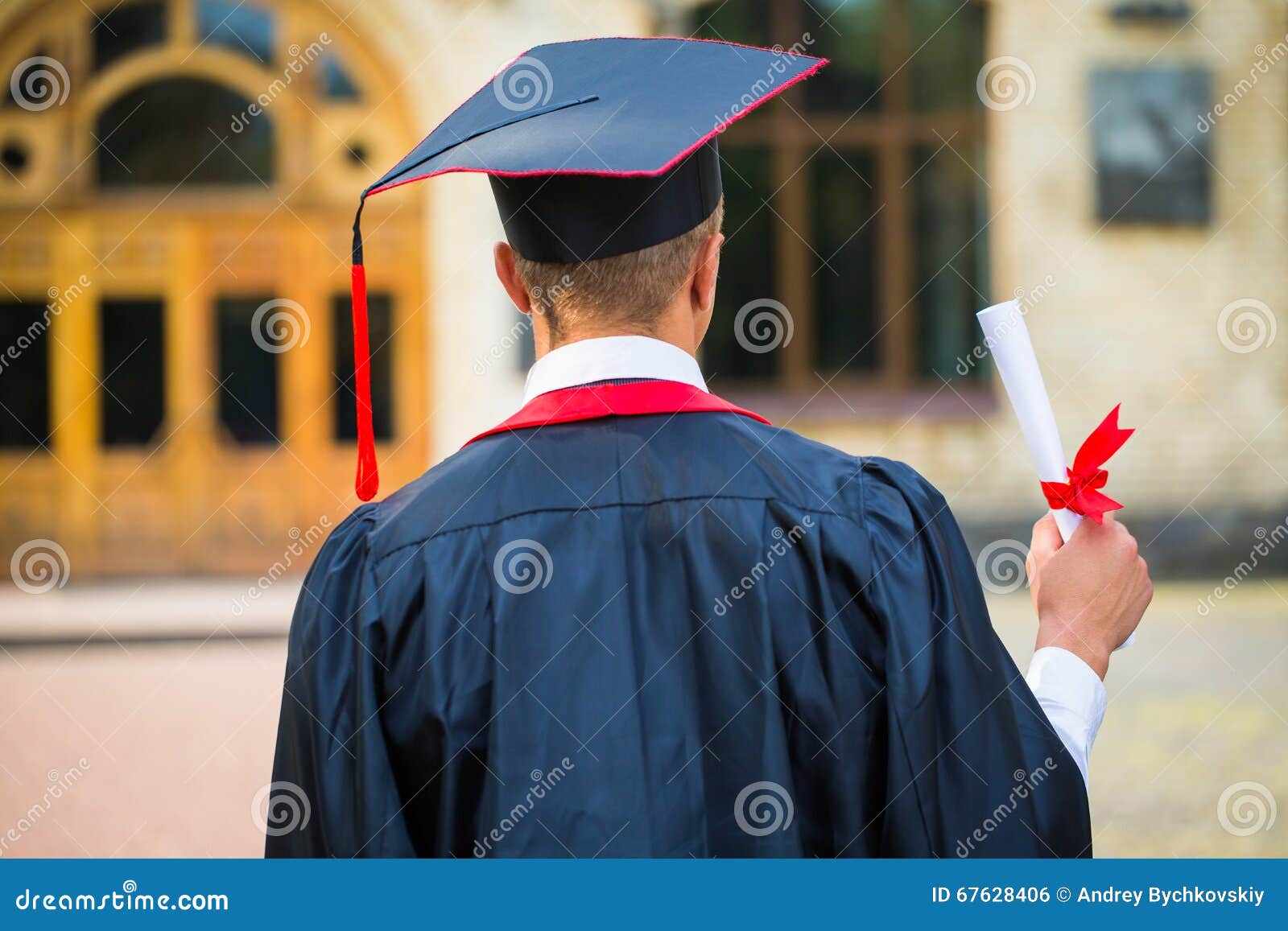 Graduate Student Hands Holding Diploma from the Back Stock Photo ...