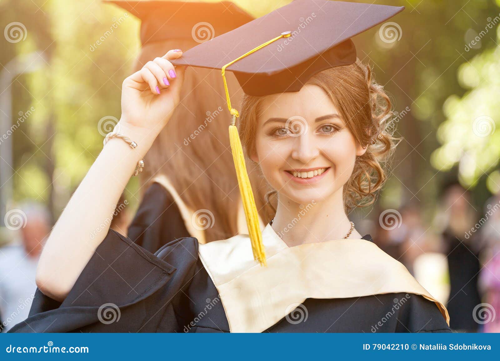 Graduate Students Wearing Graduation Hat and Gown Stock Photo - Image ...