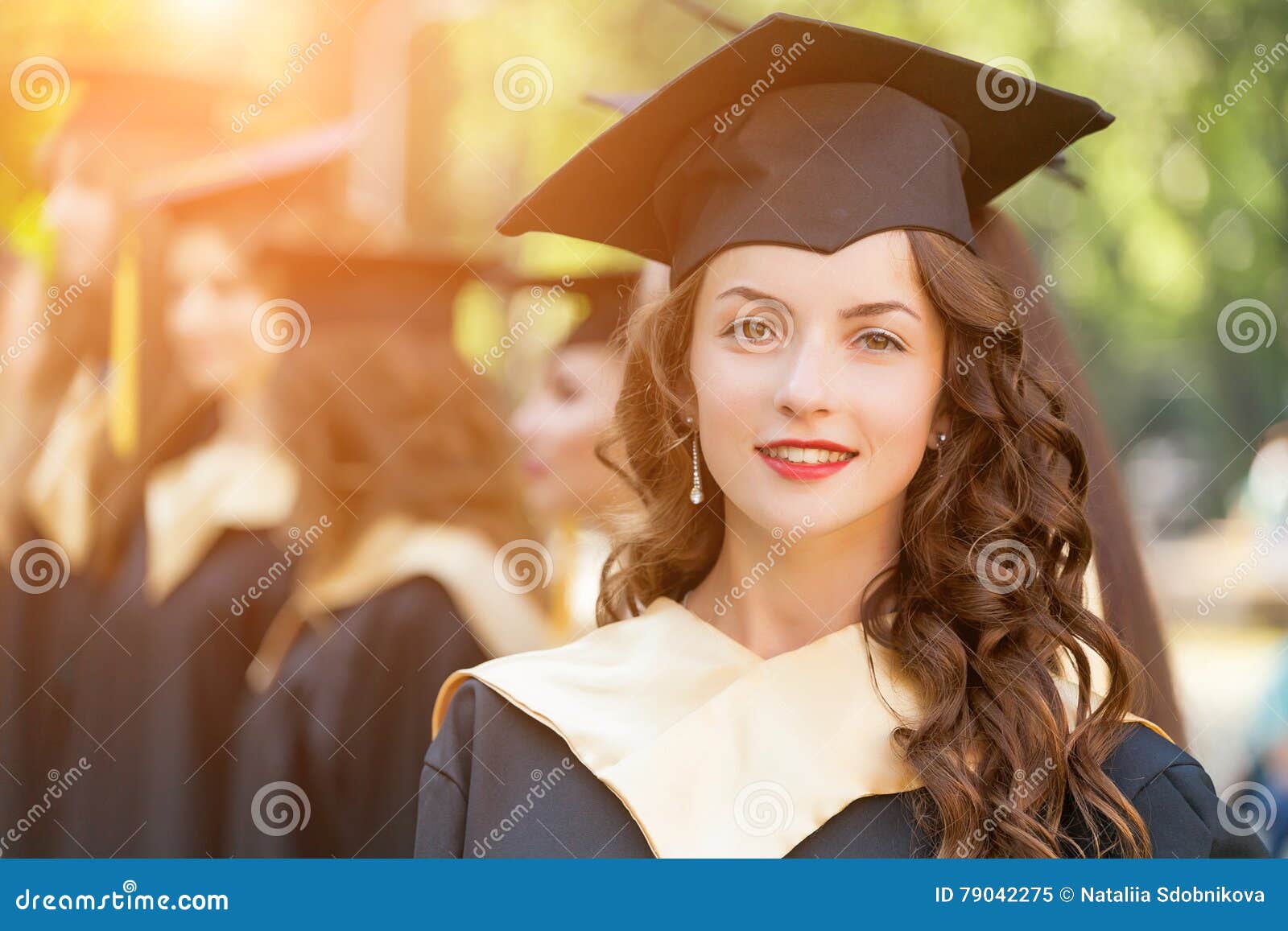 Graduate Students Wearing Graduation Hat and Gown Stock Image - Image ...