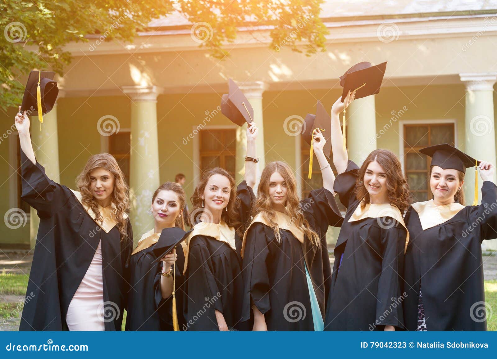 Graduate Students Wearing Graduation Hat and Gown Stock Image - Image ...
